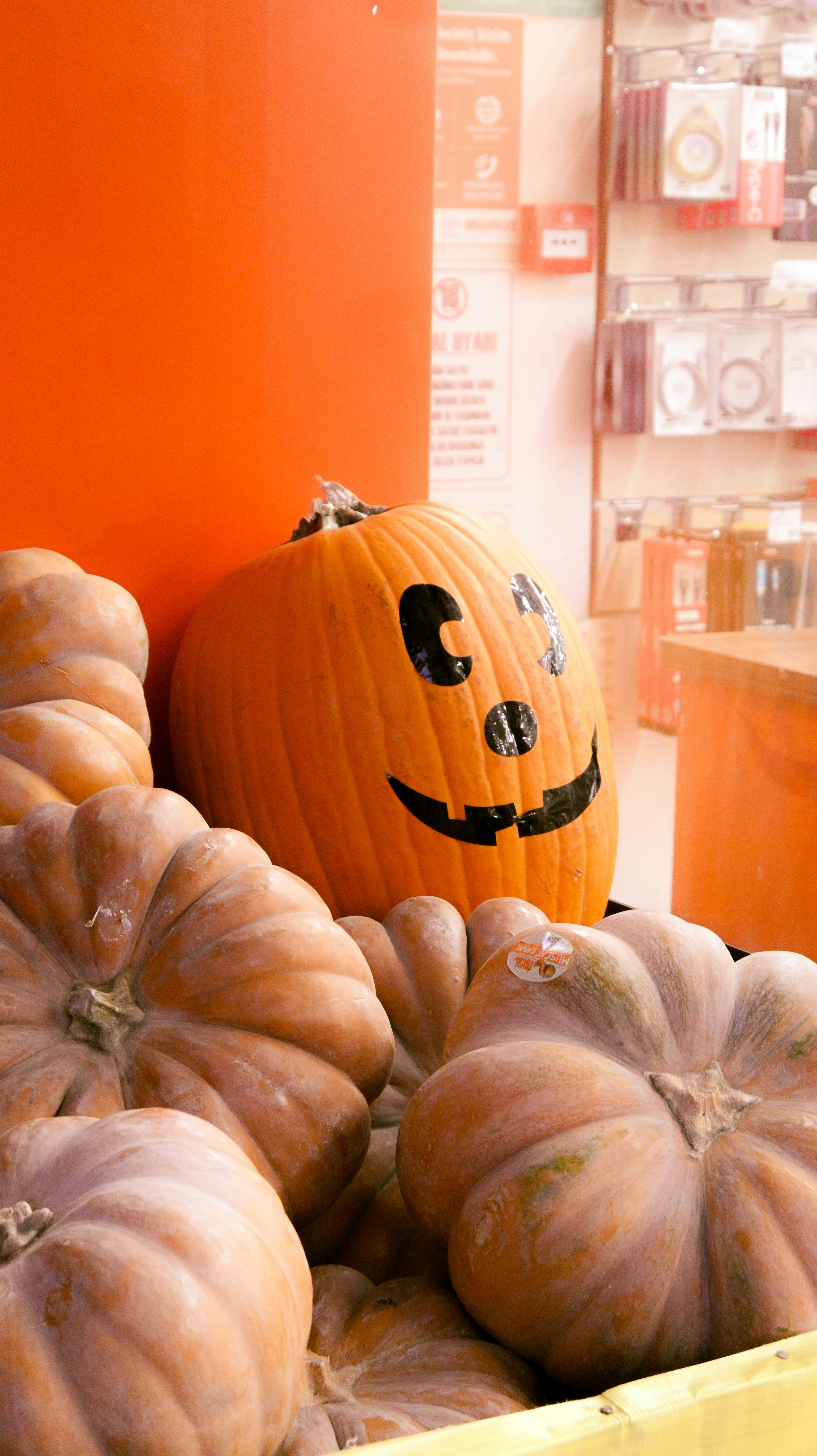 Harvest Smiles: A Playful Pumpkin Display