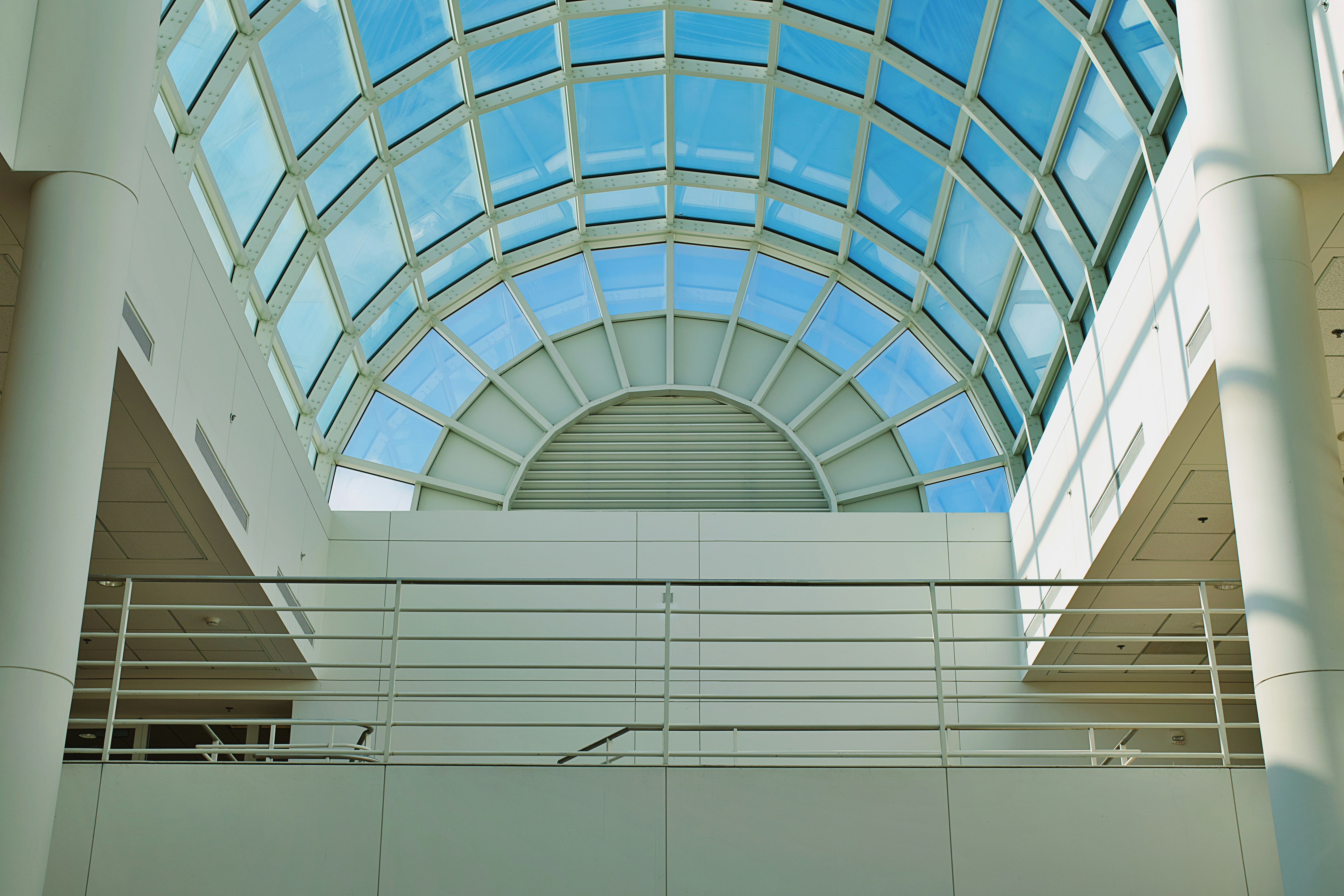 A large atrium with a skylight above it photo – Free University of ...