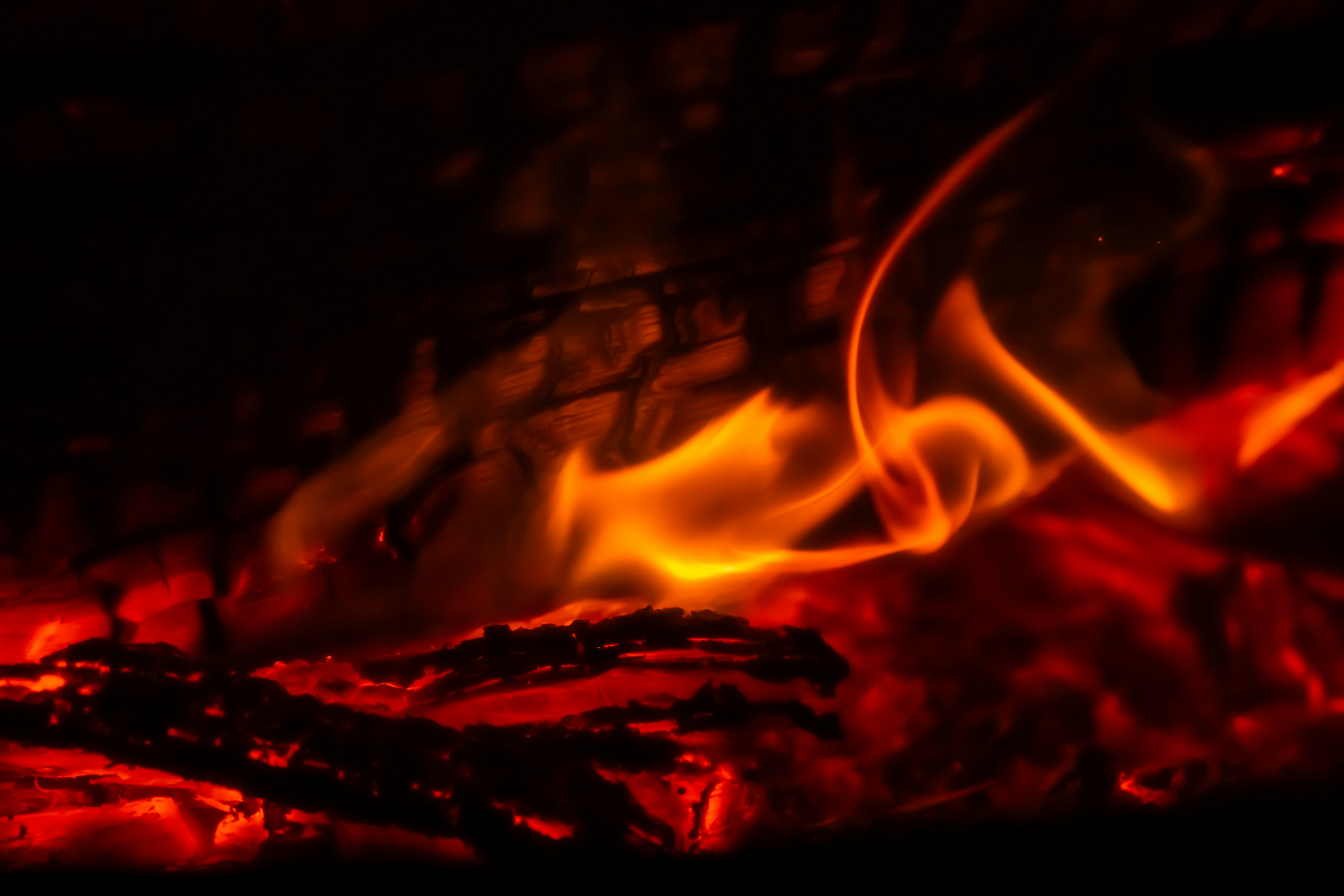 A close up of a fire burning in a fireplace photo – Free Fire Image on ...