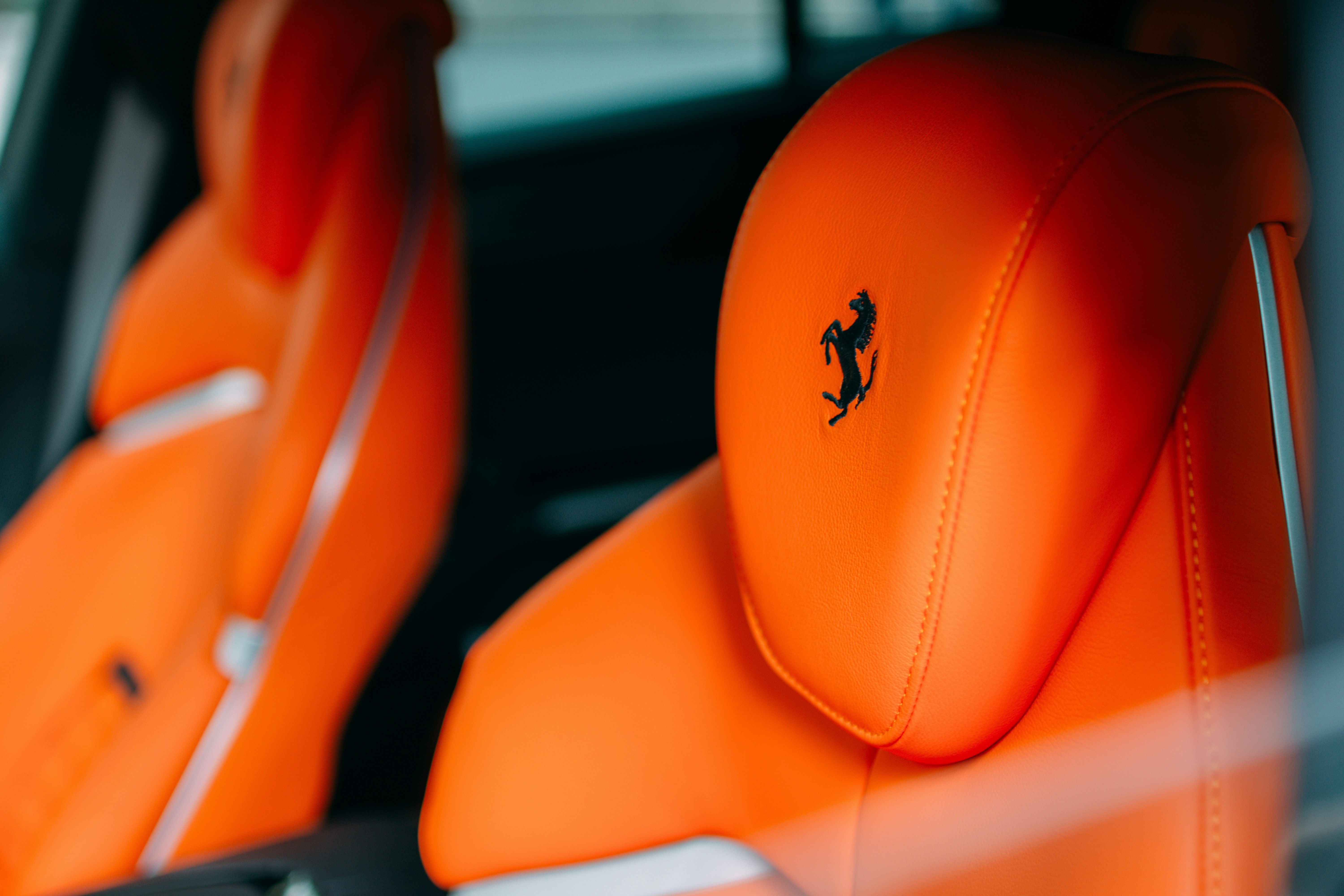 Bright Orange Ferrari Cabins: A Close Look at Pristine Orange Leather Seats