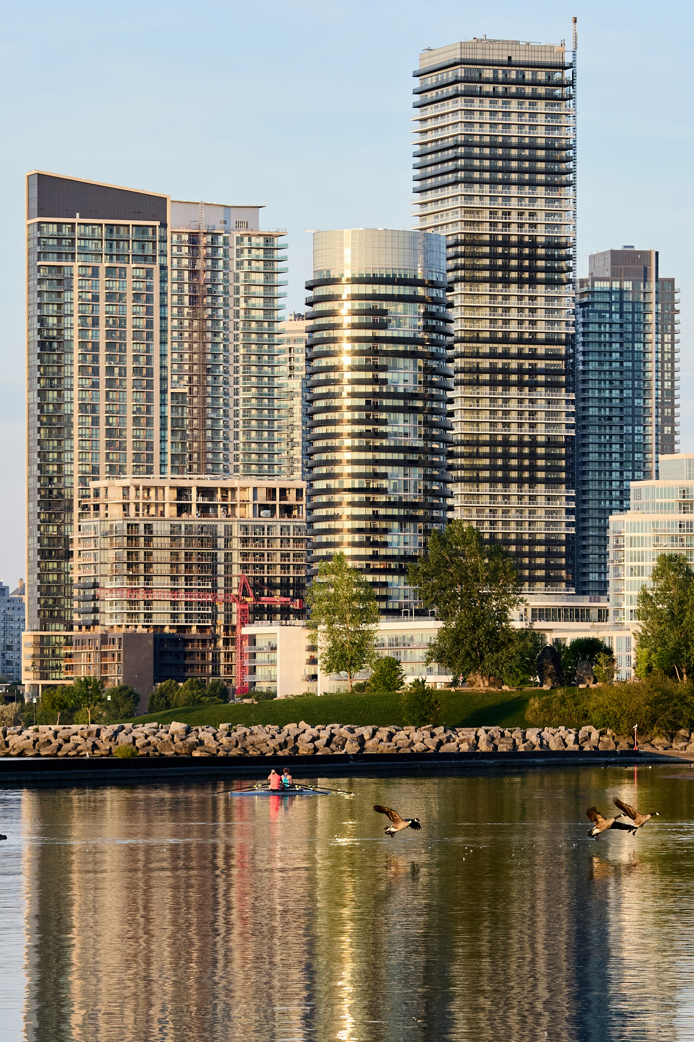 Glass-Fronted Skyline Over a Quiet Waterfront