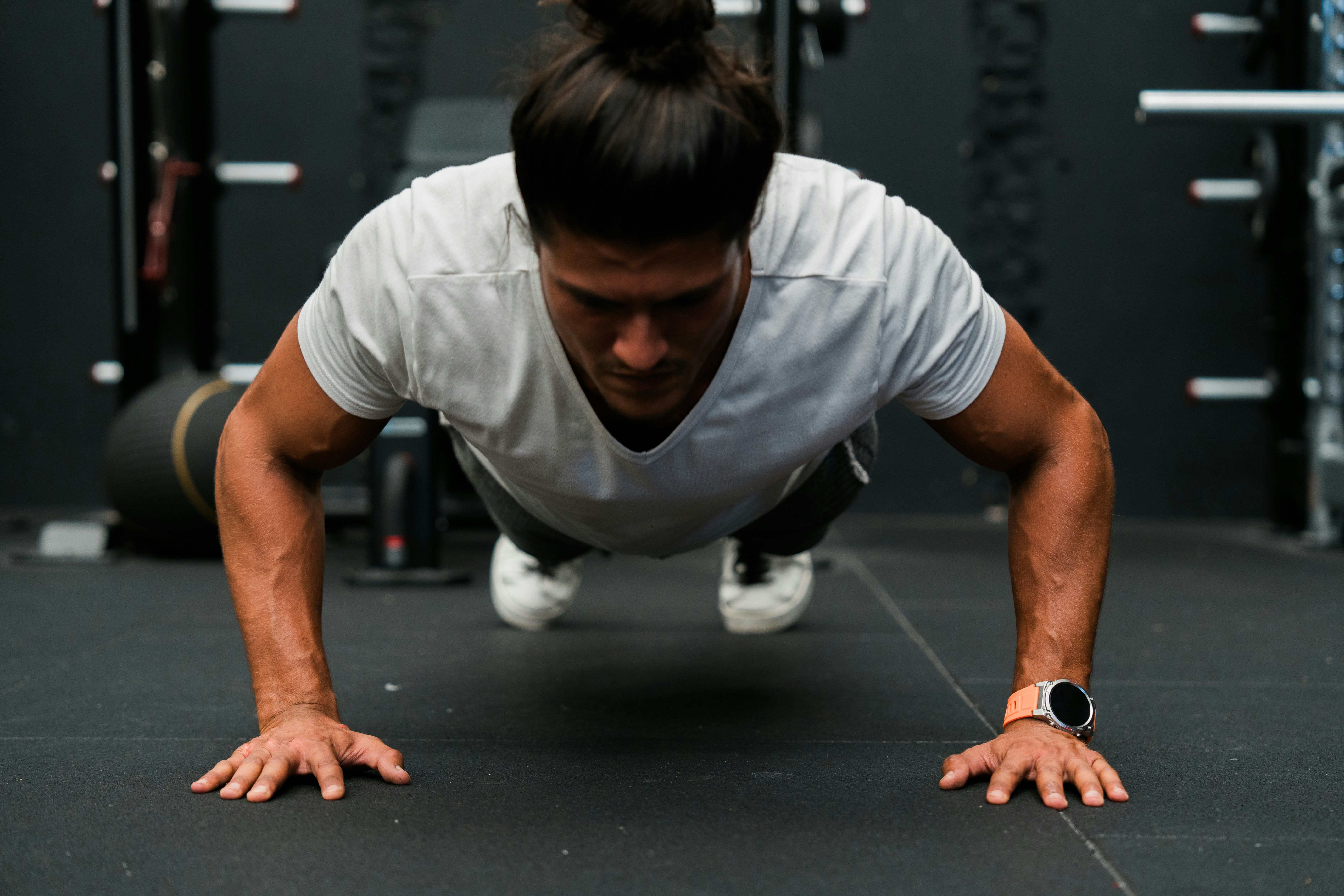 A man doing push ups in a gym photo – Free Fitness Image on Unsplash