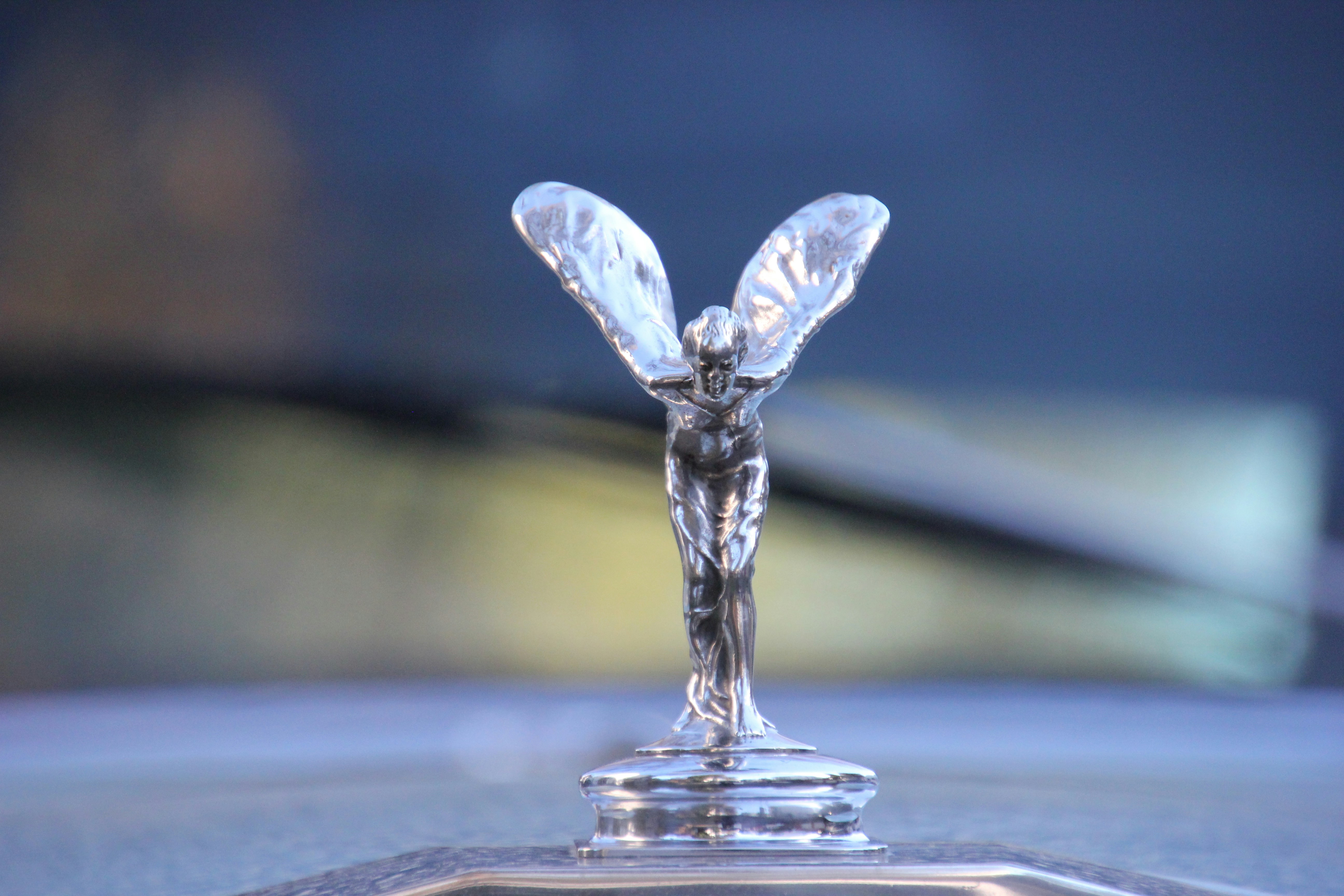 Chrome Angel on the Hood: a moment of quiet radiance