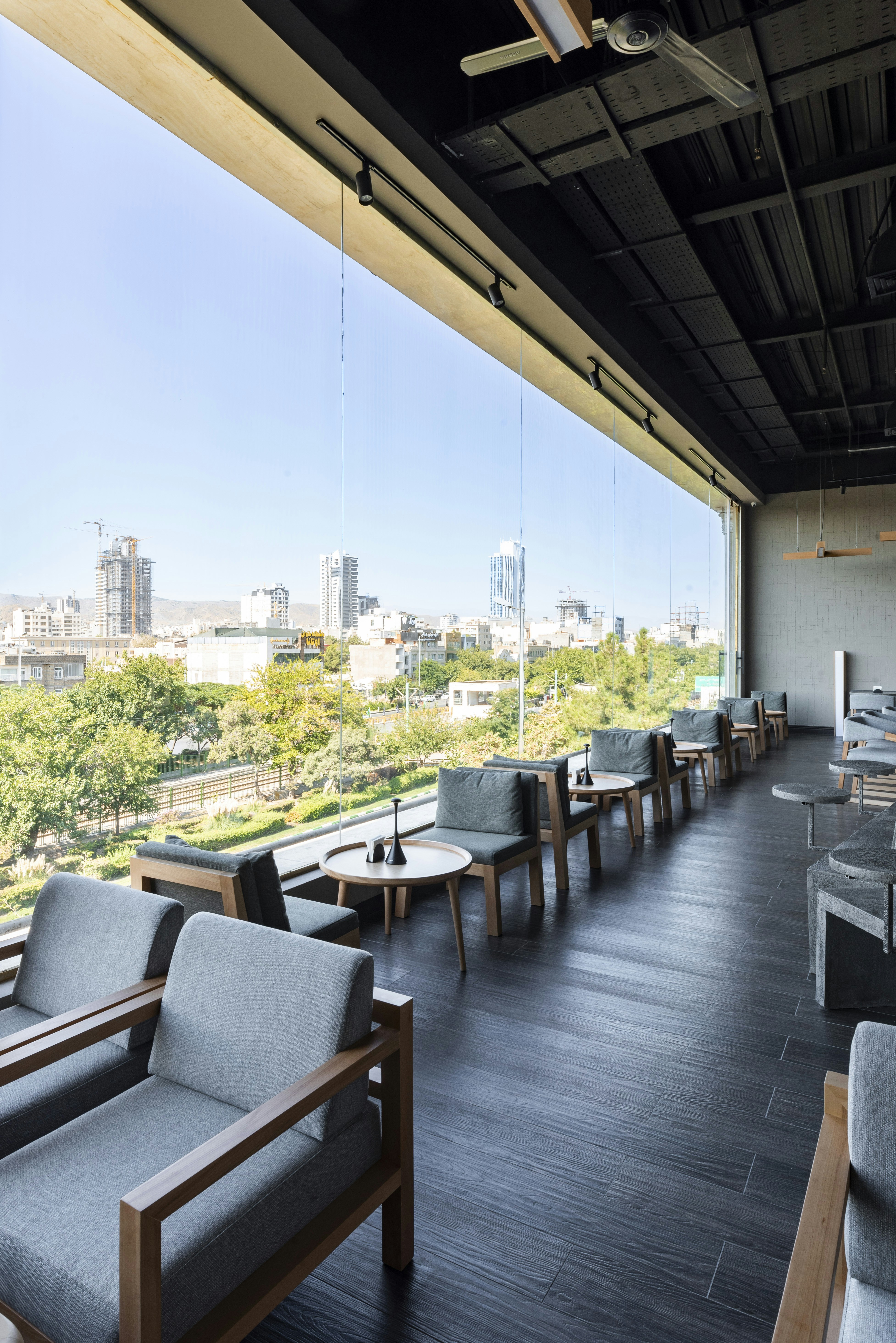 The Quiet Balcony: Urban Light and Lounge