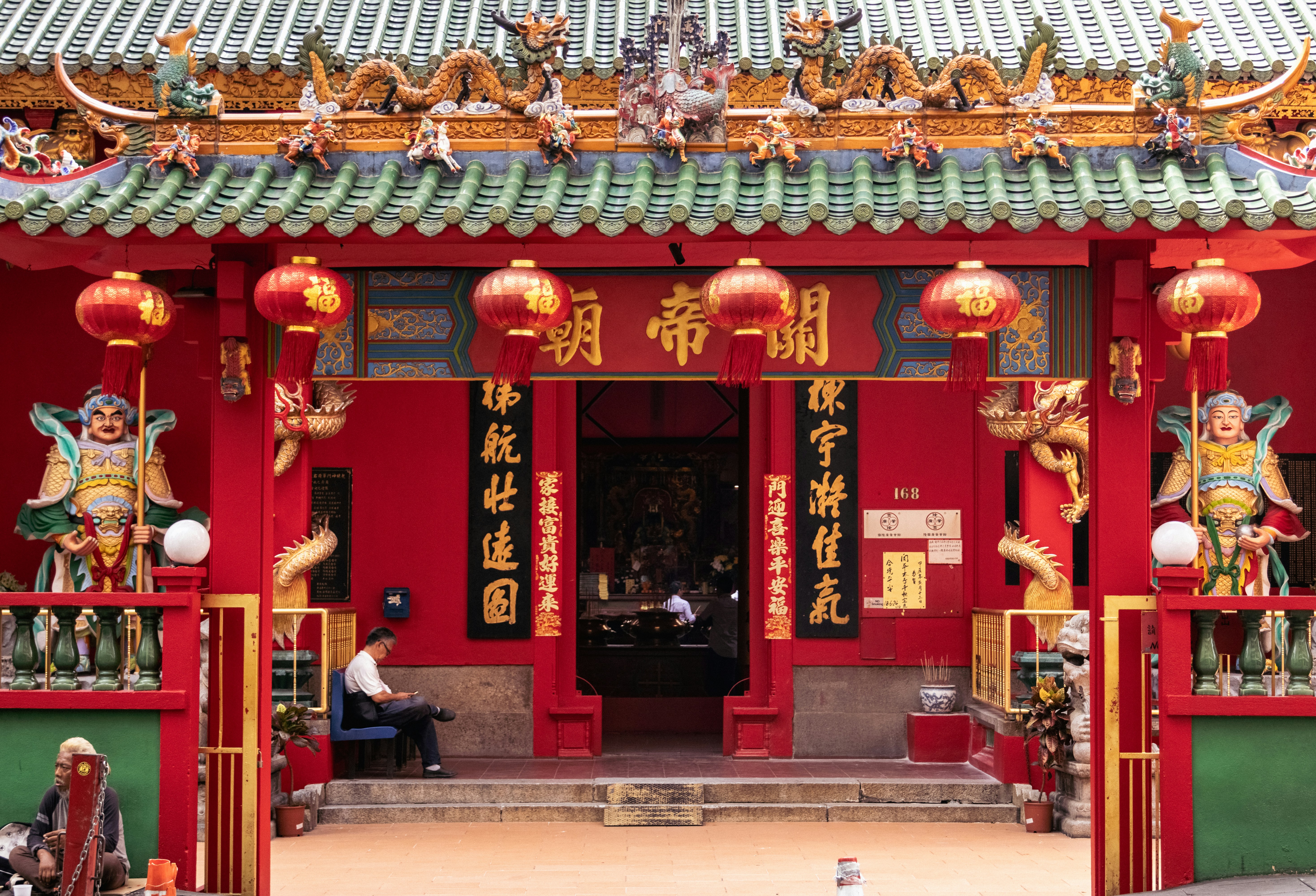 A red building with oriental decorations on it photo – Free Kuala ...