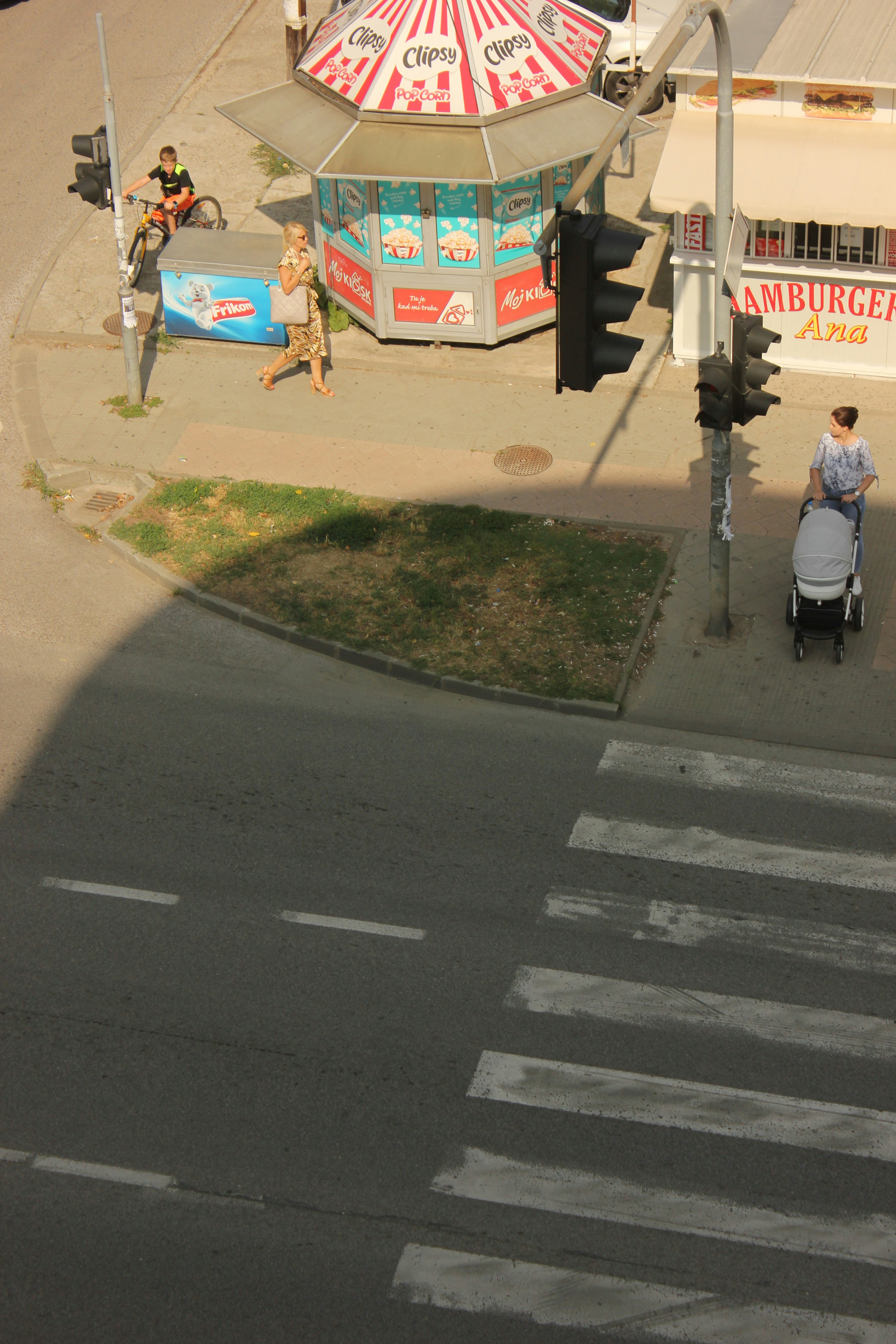 An aerial view of a street corner with a carnival tent photo – Free ...