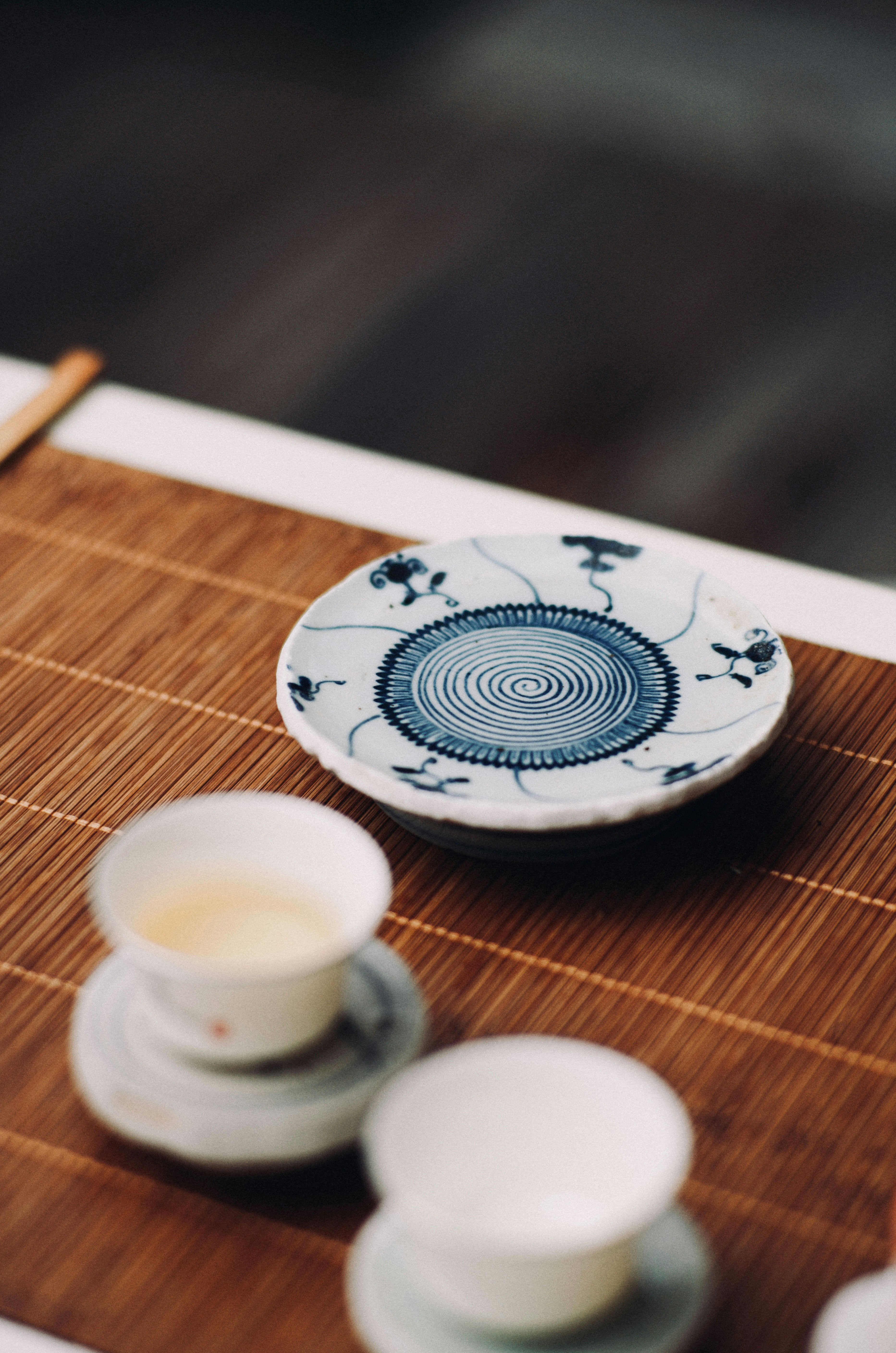 A table topped with a plate and cups of coffee photo – Free Food and ...