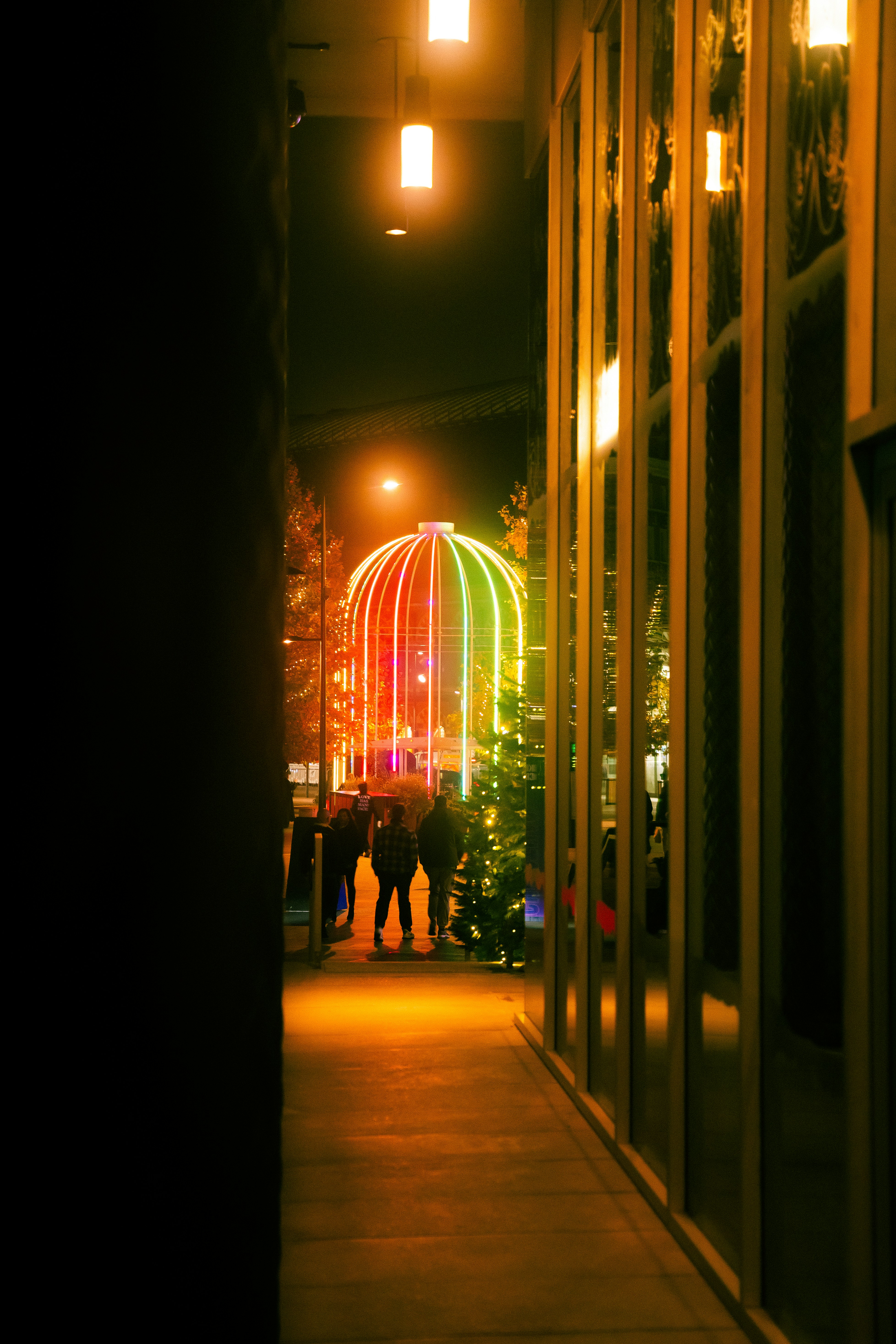 Rainbow Dome Framed by a Narrow City Alley