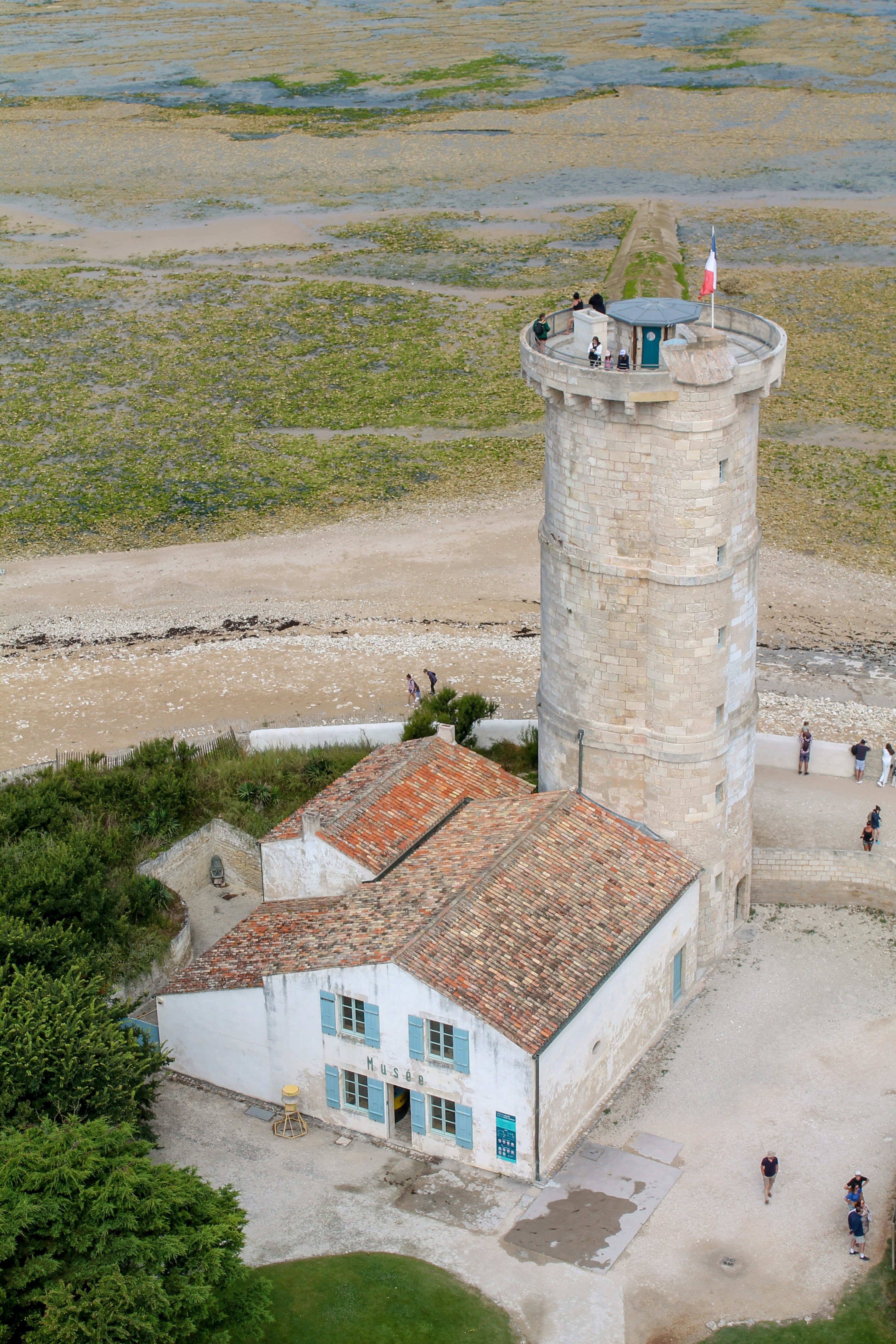 Coastal Sentinel: Round Tower Overlooking the Shore