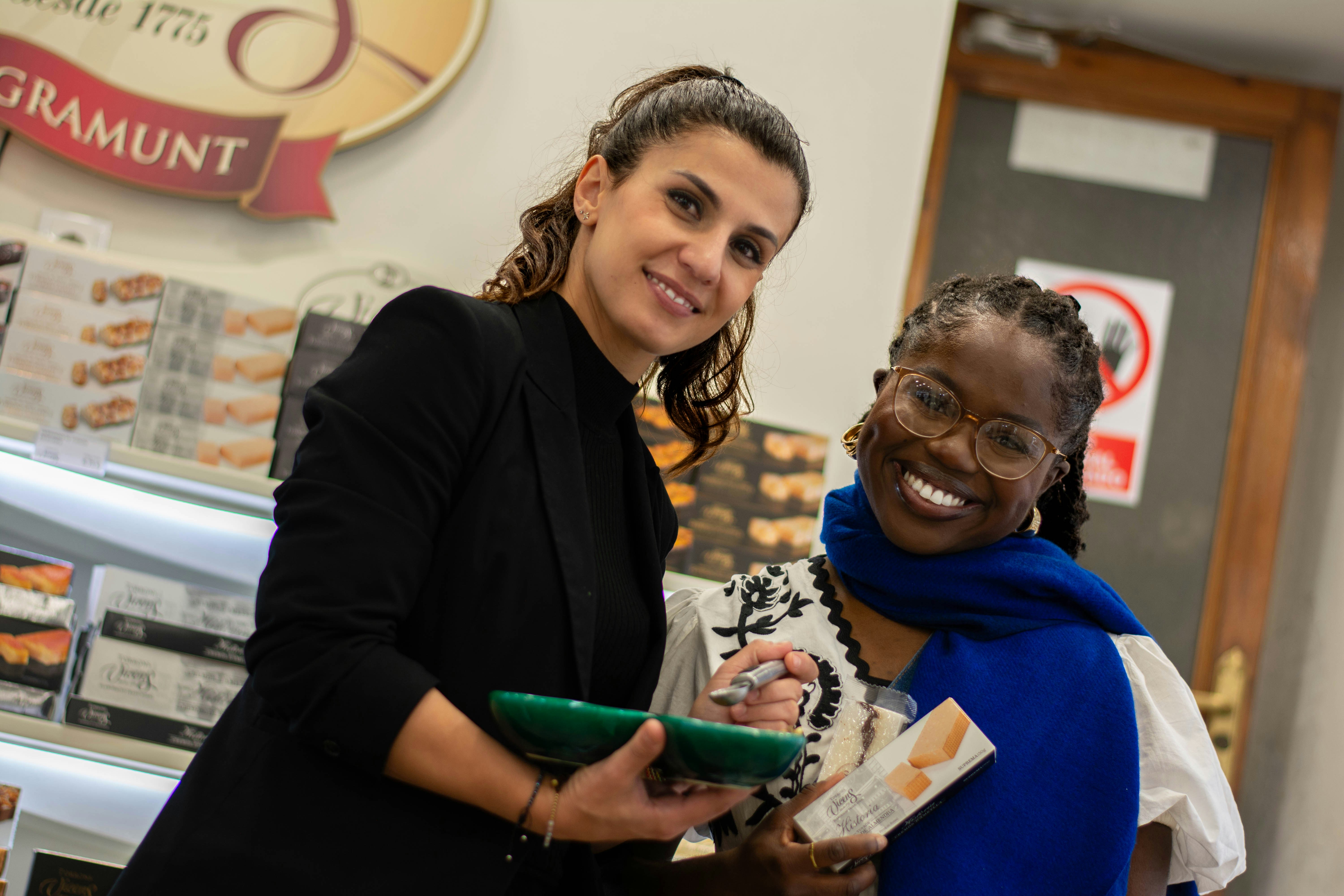 Warm Exchange by the Pastry Display