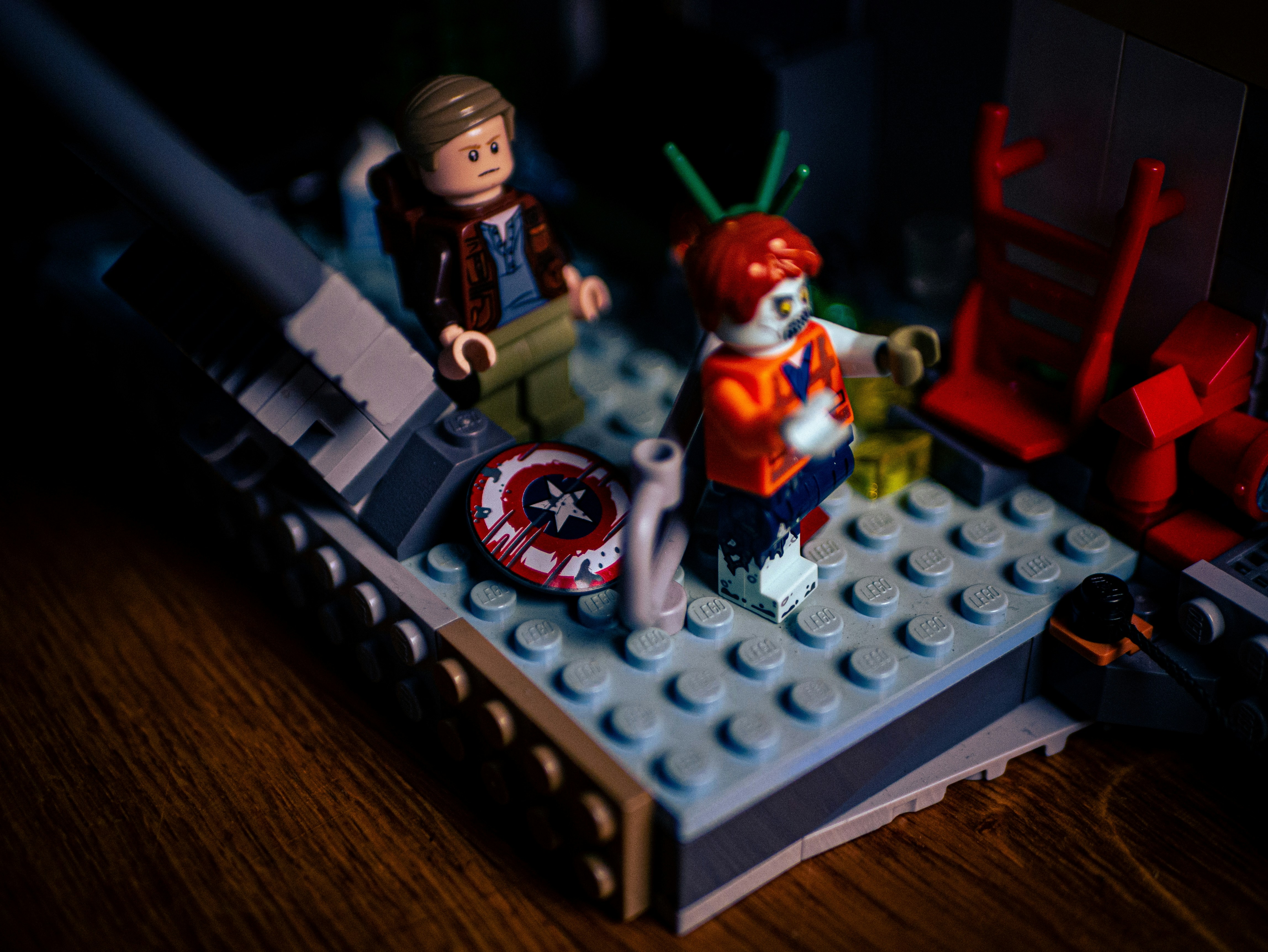 A couple of legos sitting on top of a table photo – Free Human Image on ...