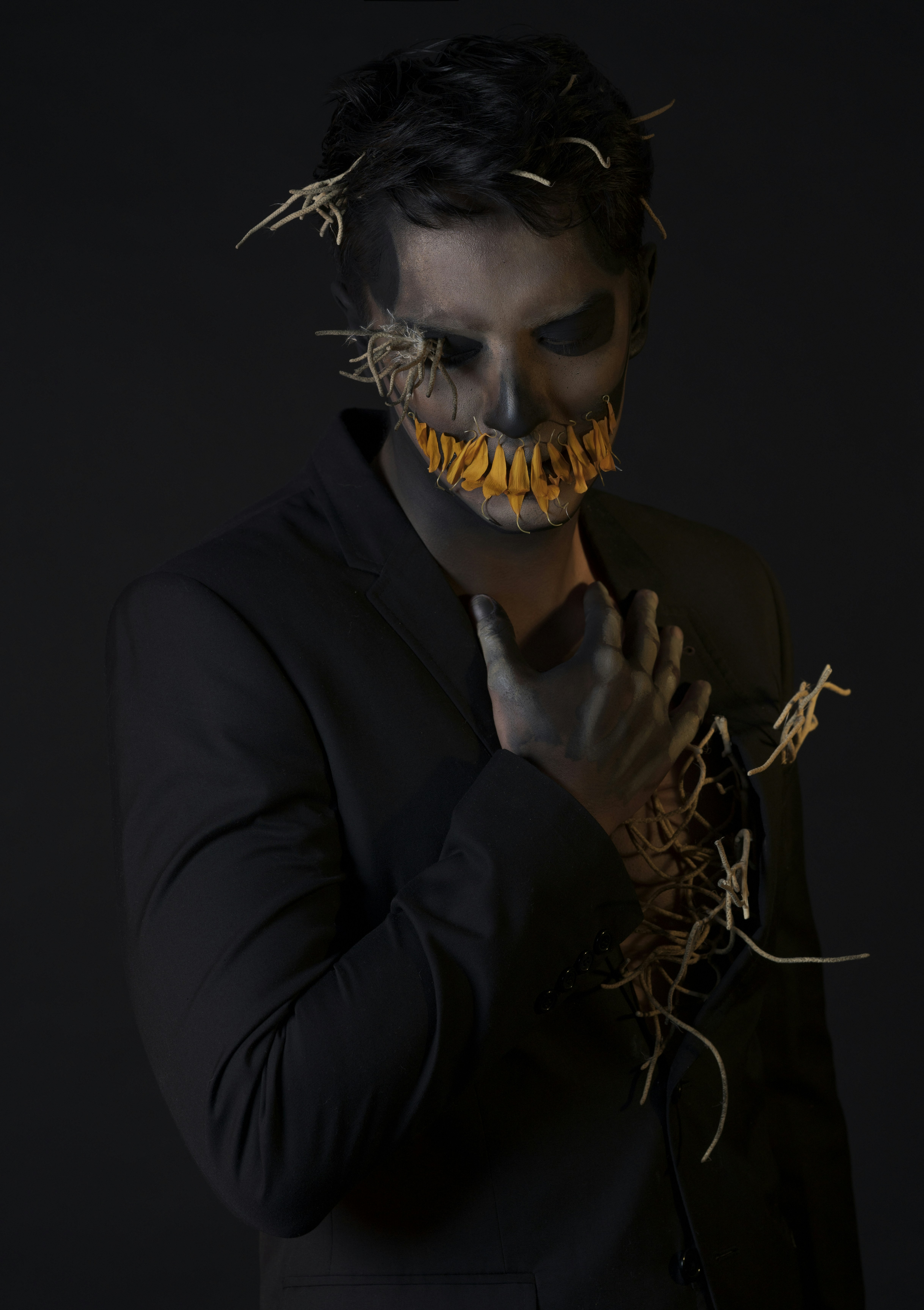 Harvested Grin in the Dark: A Portrait of Muted Intensity