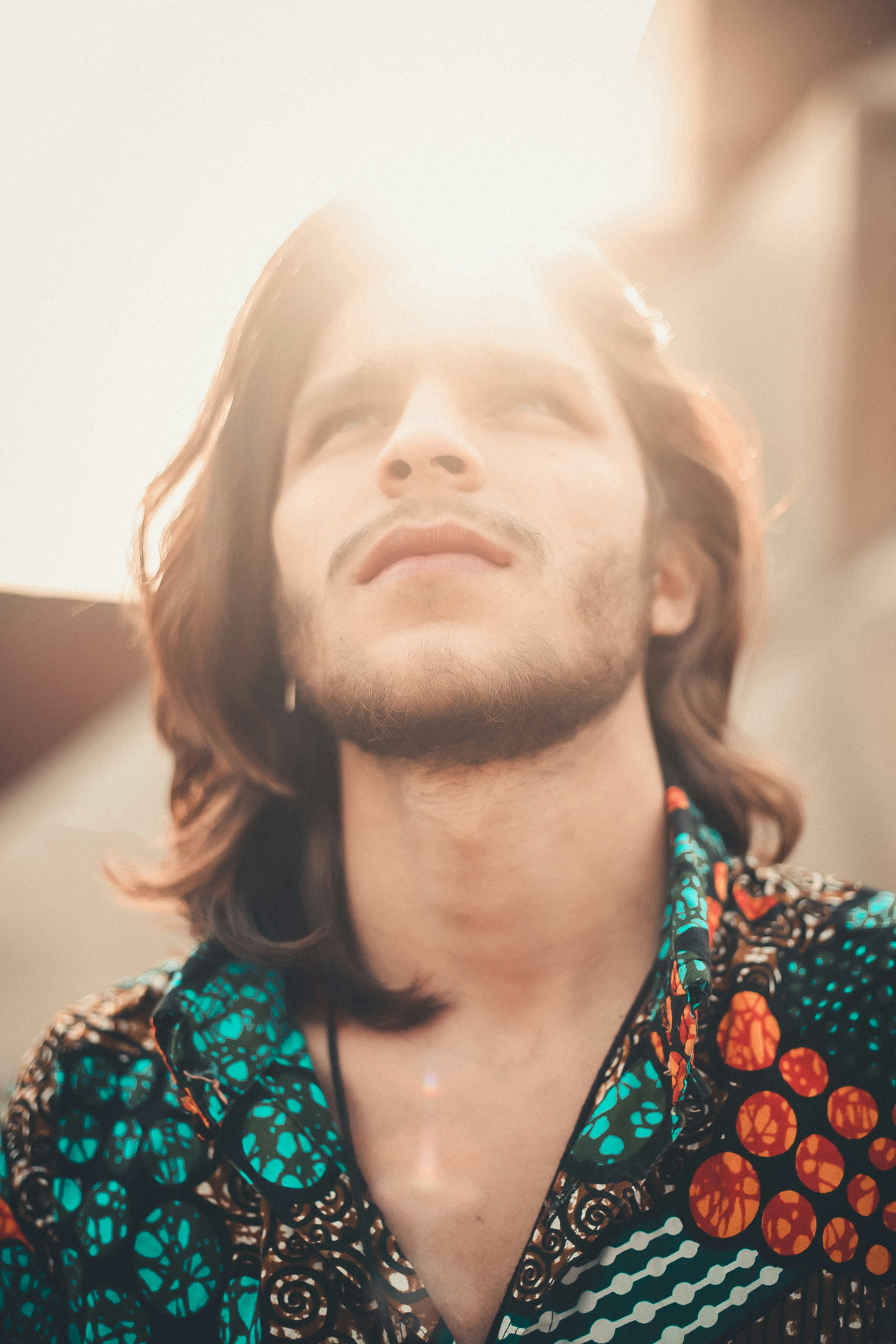 Sunlit Reverie: Portrait Under a Halo of Light