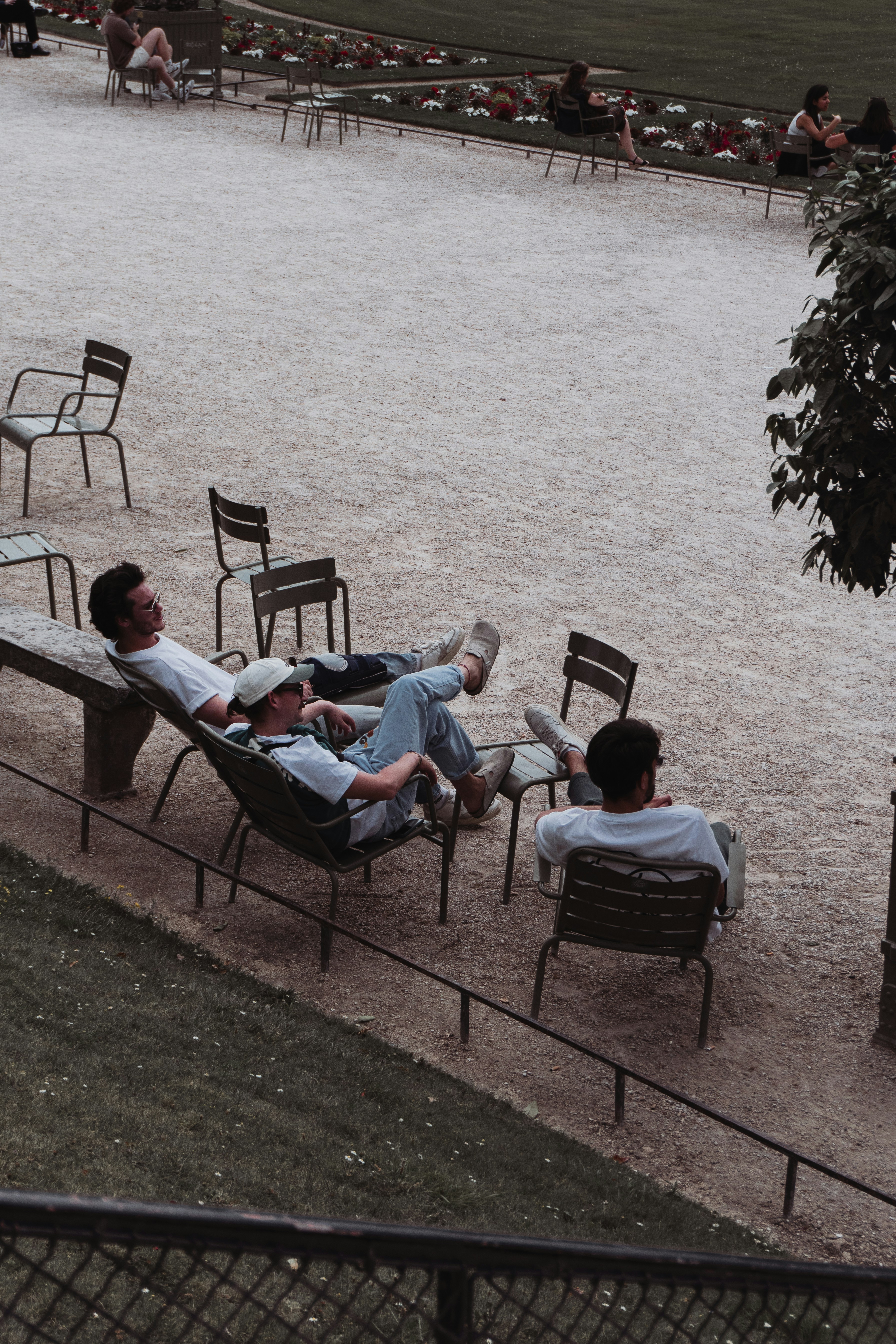 Parkside Recliners: Quiet Vibes Along a Gravel Park Path