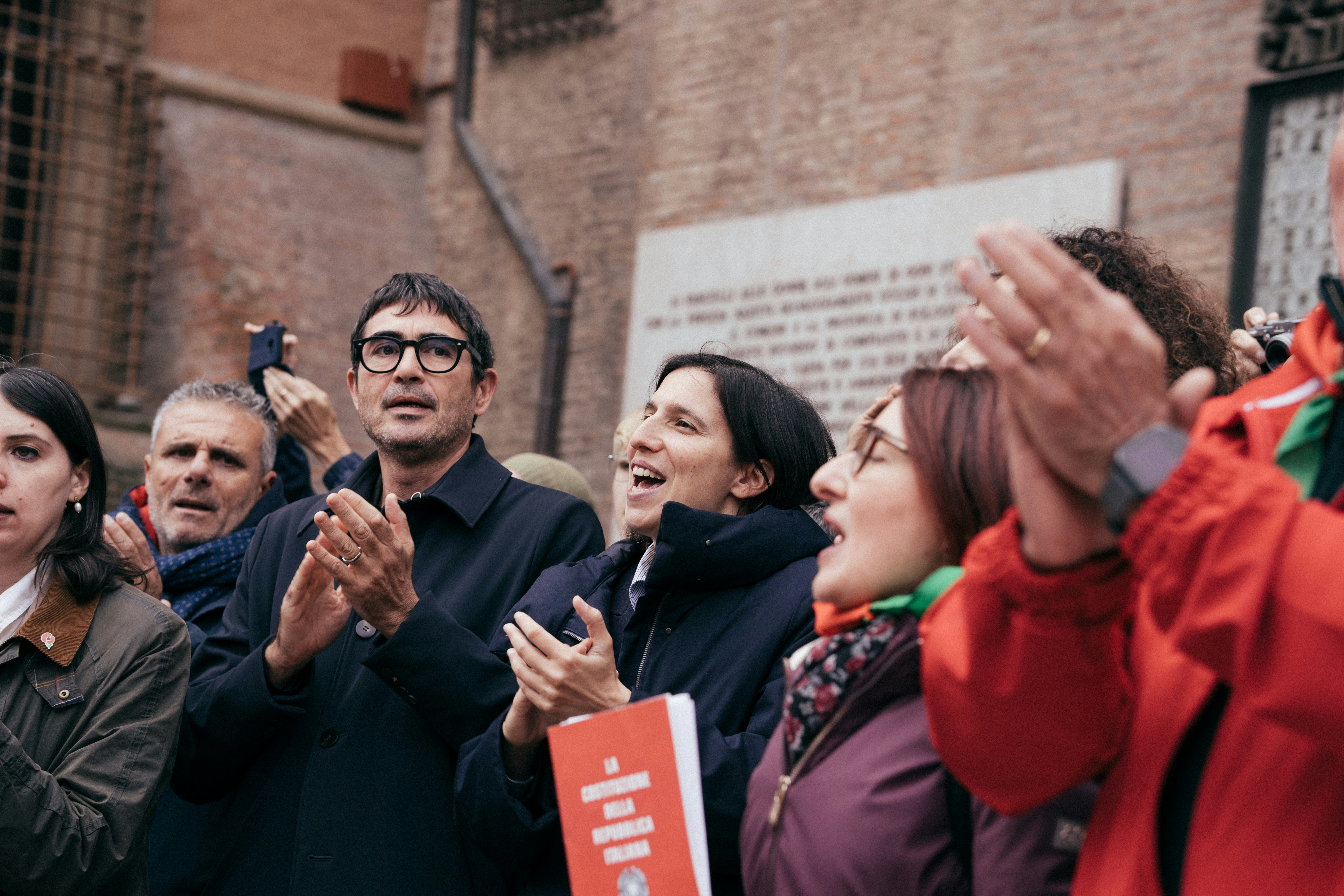 A group of people standing next to each other photo – Free Italy Image ...