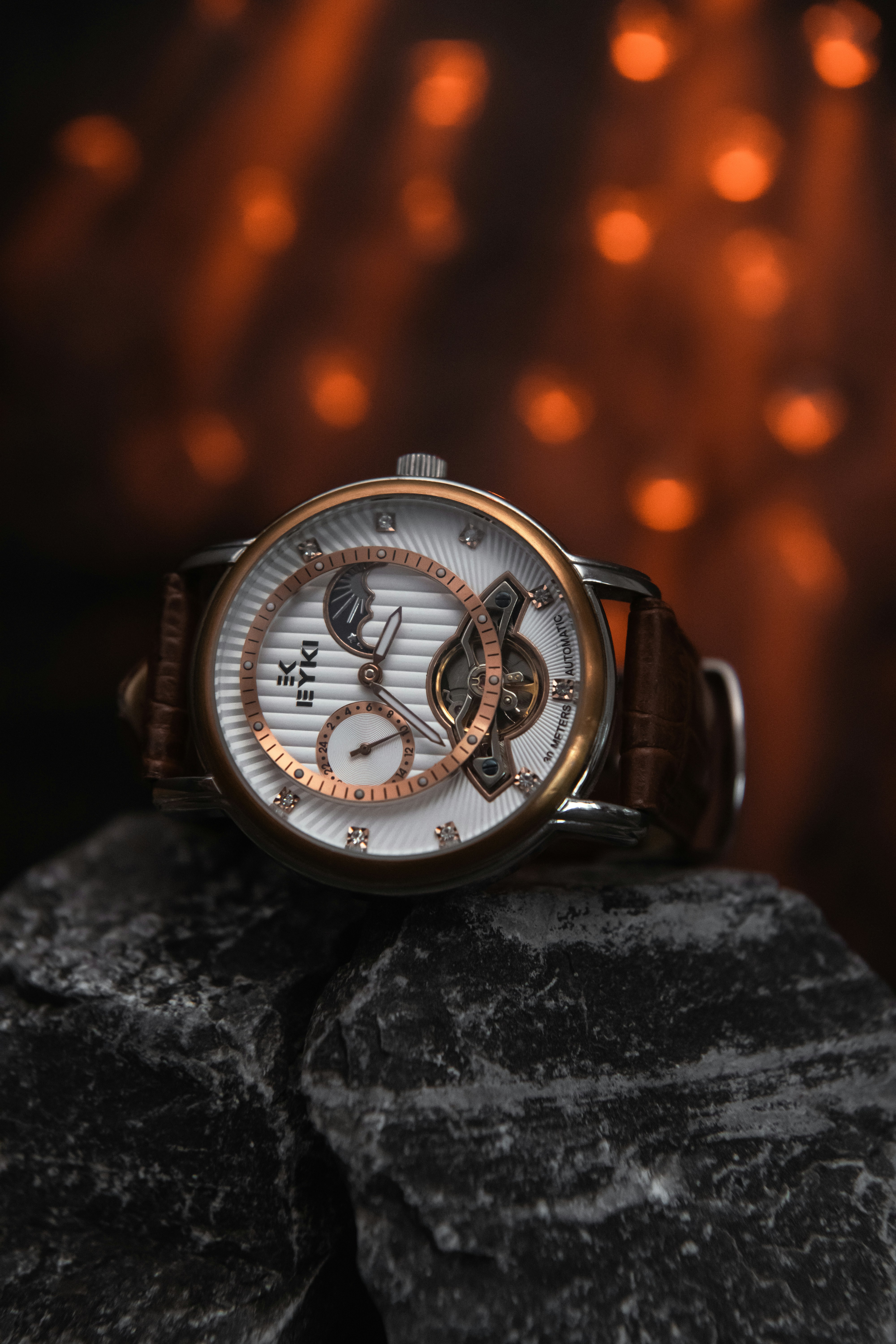 Copper Dial on Basalt: A Luxury Watch in a Glowing Studio