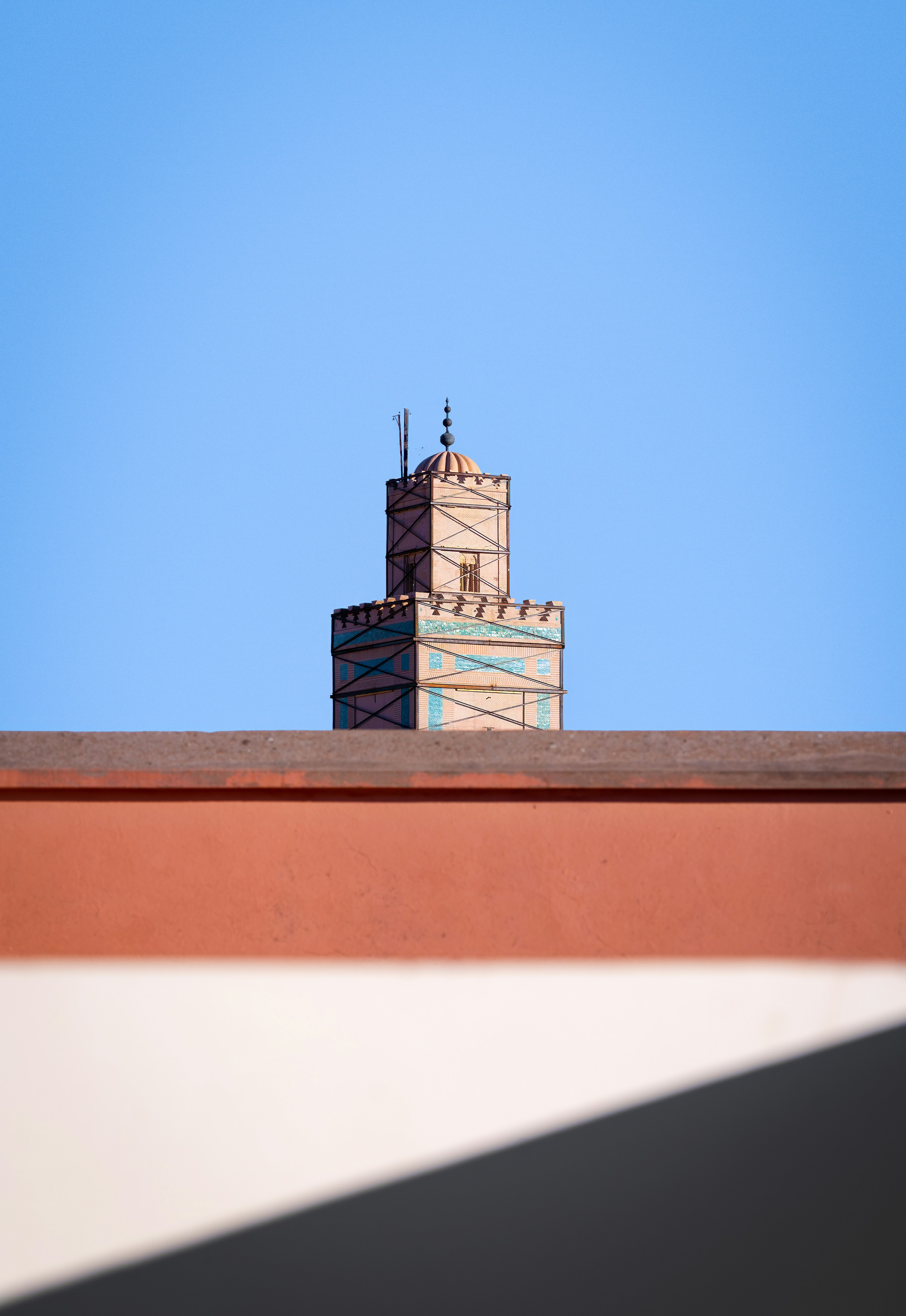 A tall building with a clock on the top of it photo – Free Morocco ...