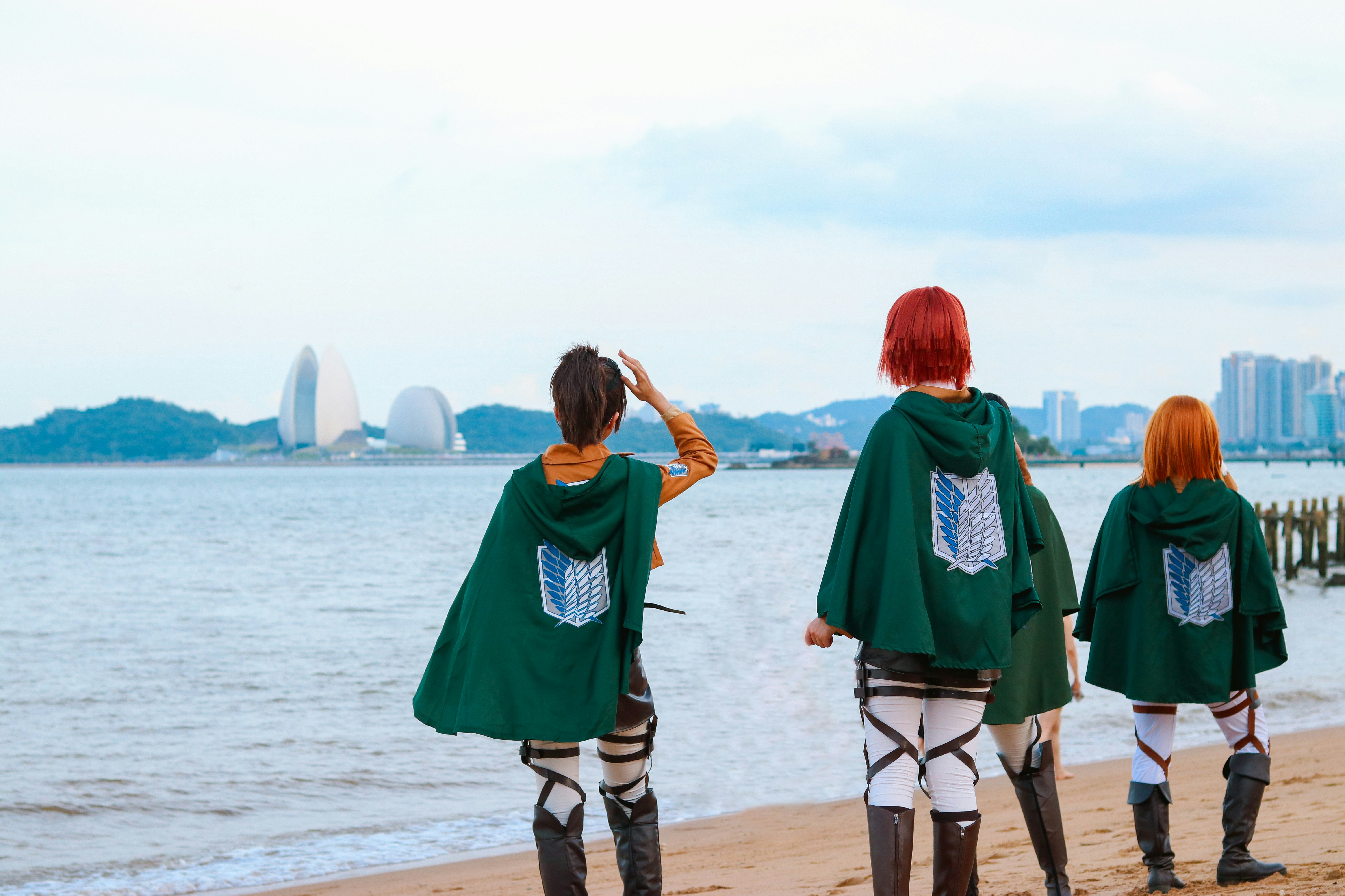 Coastal Guardians in Green Cloaks