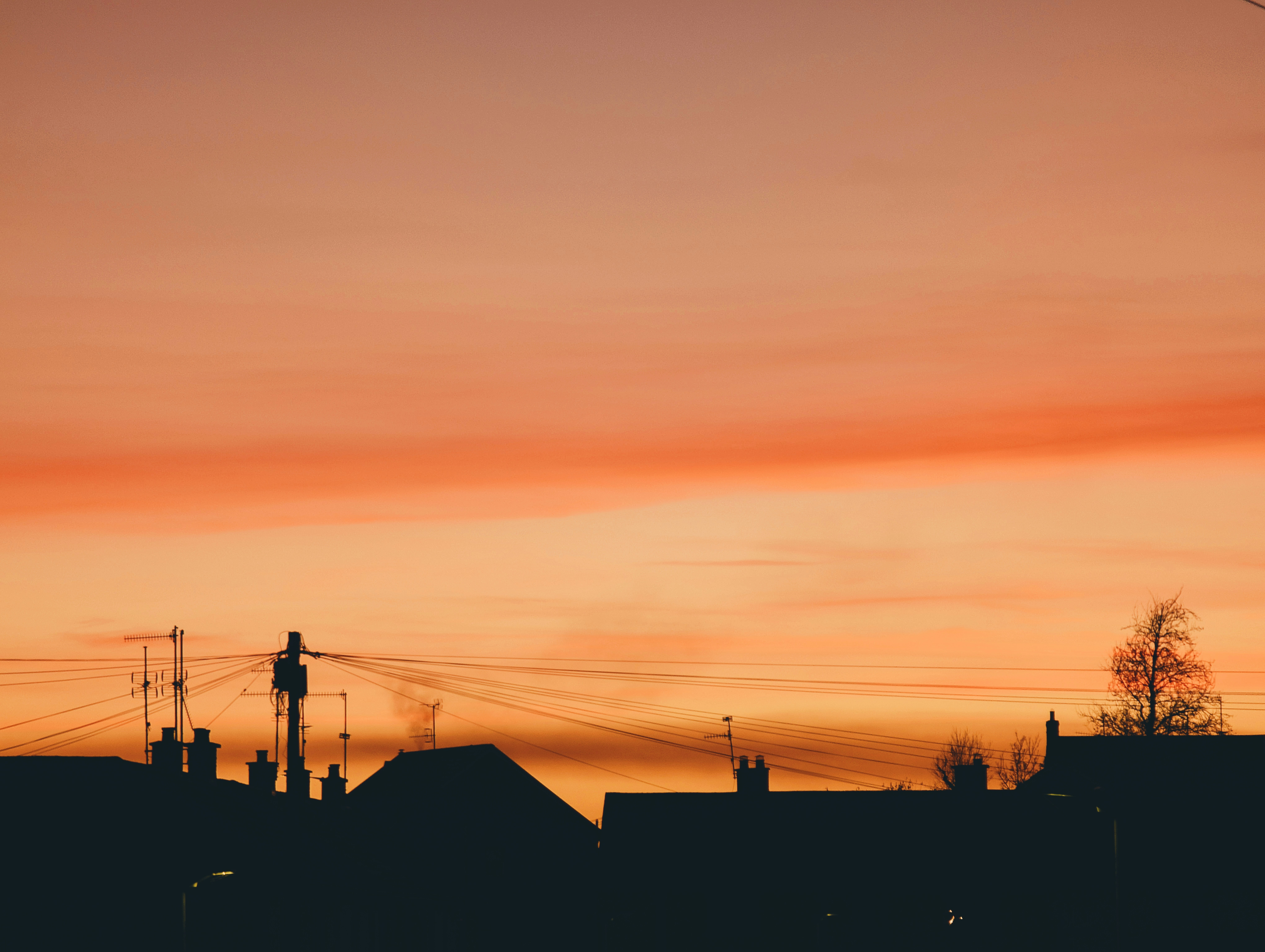 A view of a sunset from a rooftop photo – Free Sunset Image on Unsplash