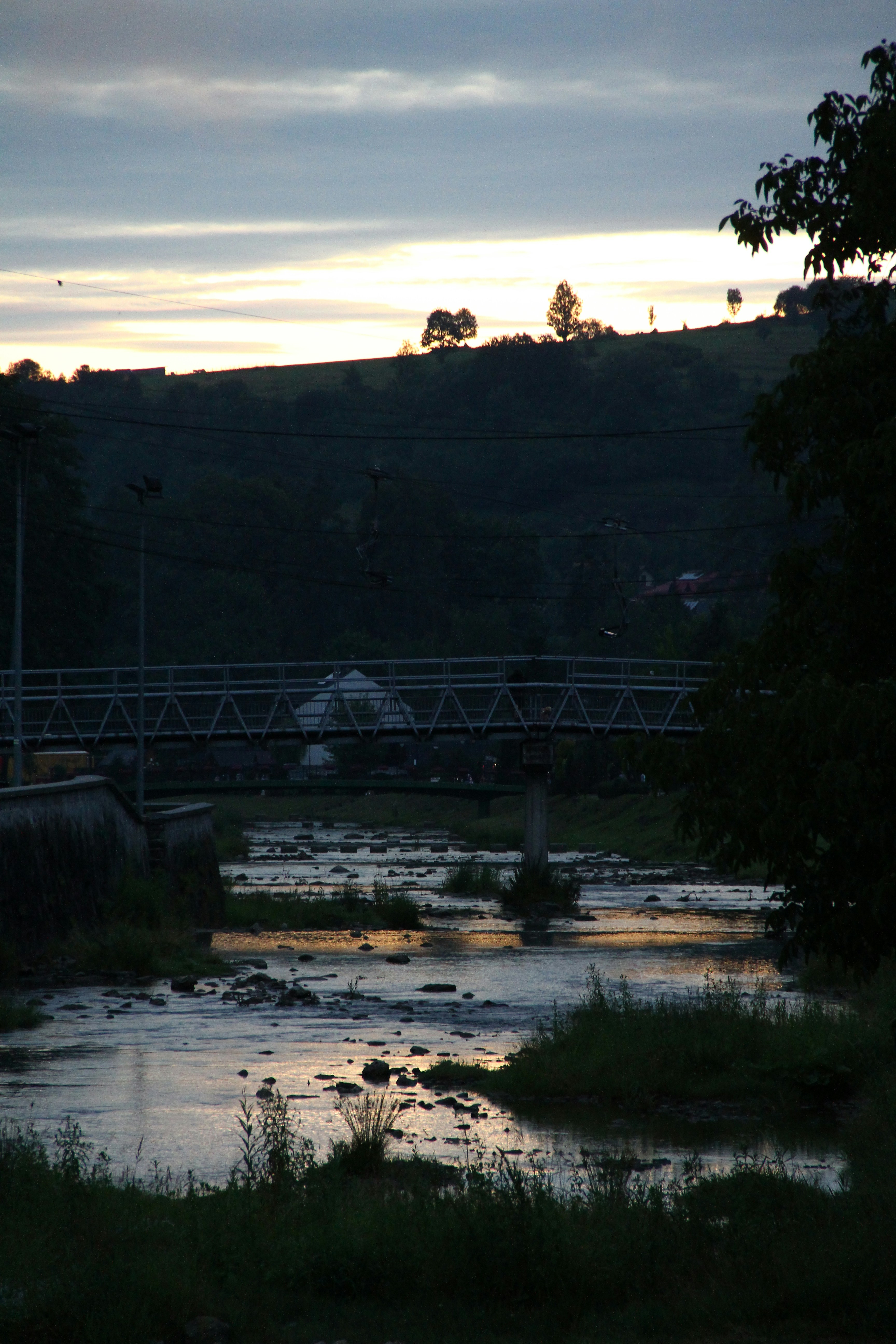 Dusk Over the River Bridge: Silhouettes and Quiet Light