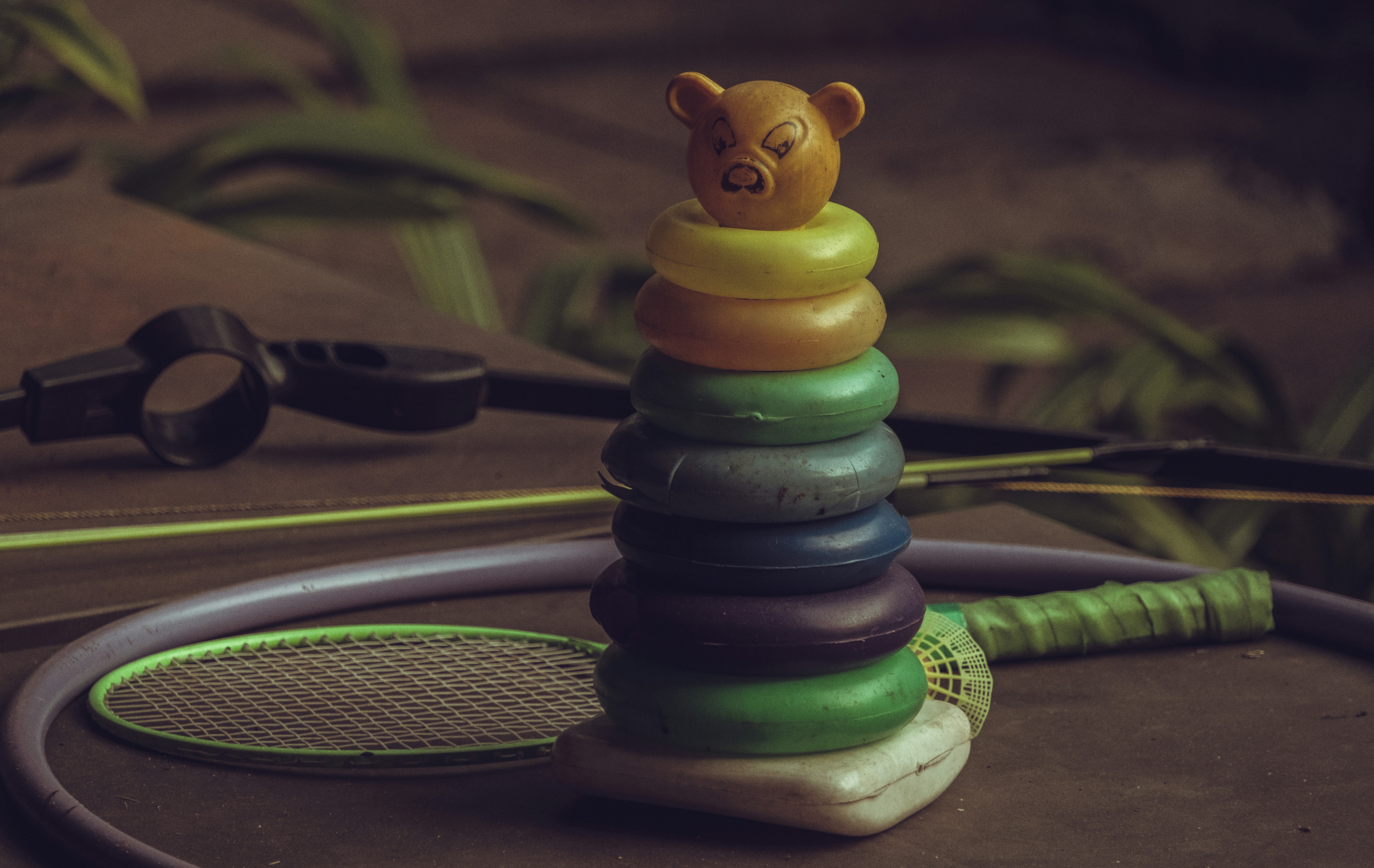 Bear Totem of Color: A Rainbow Ring Stack on a Quiet Desk