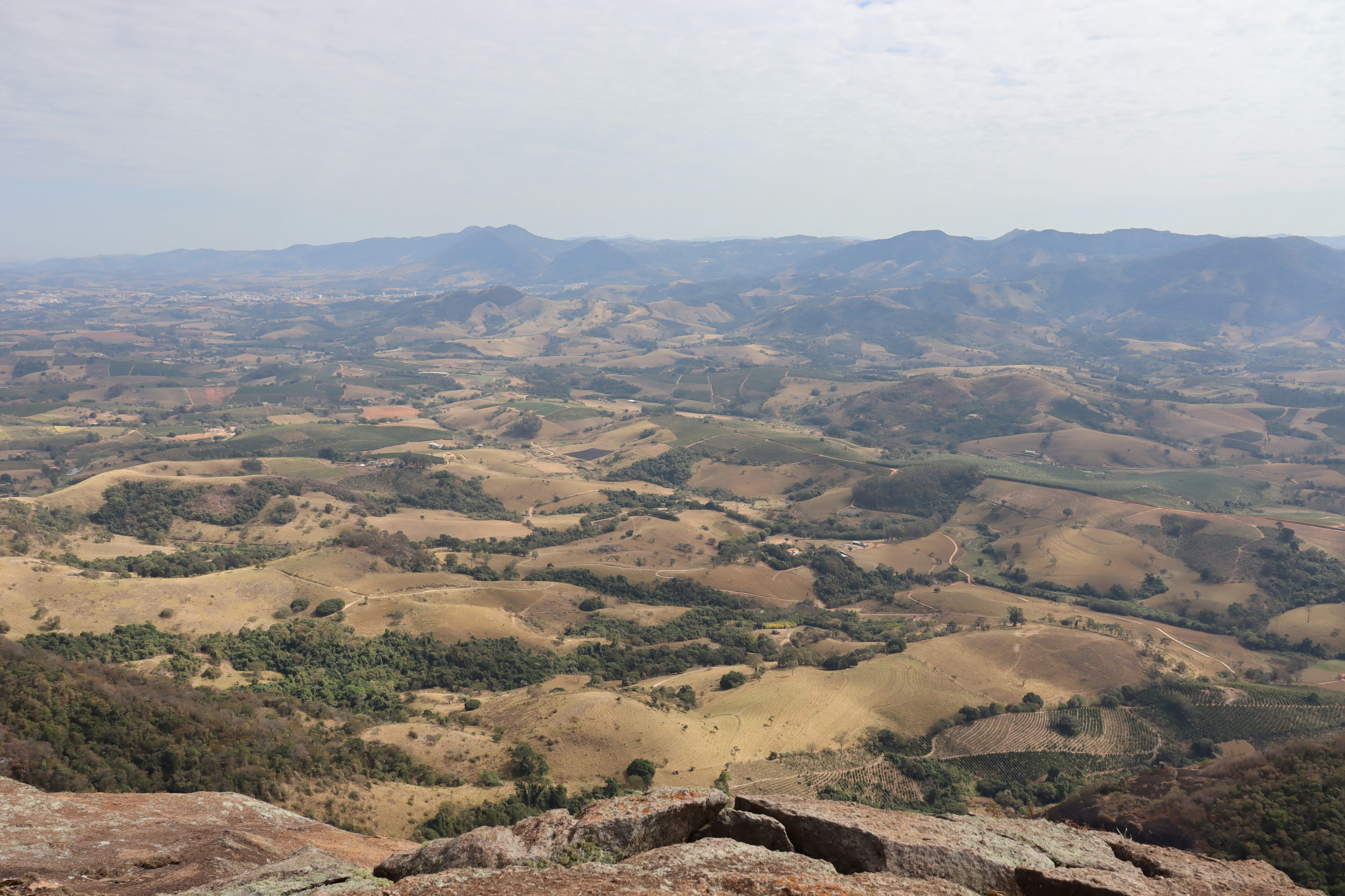 A view of a valley from the top of a mountain photo – Free Wallpaper ...