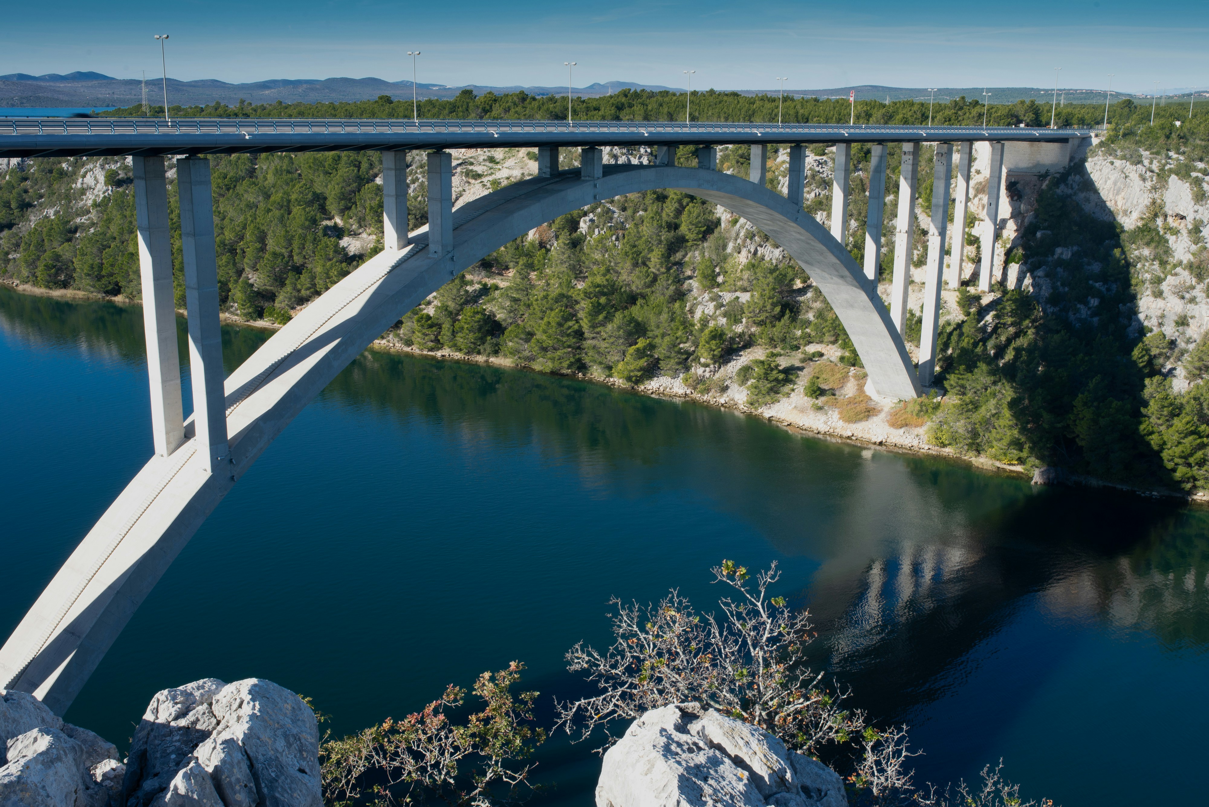 The Arched Pathway Over Tranquil Waters