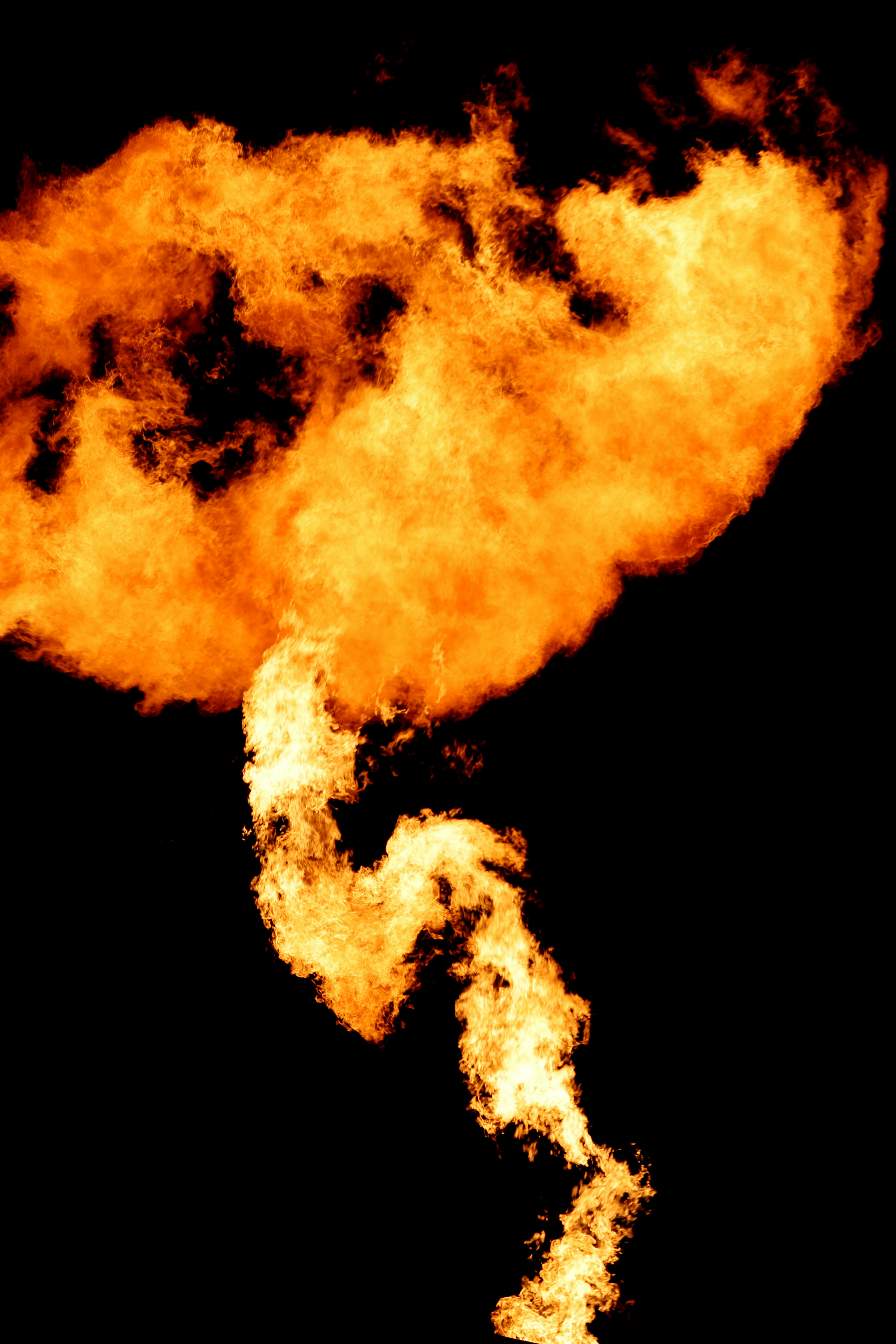 A large orange fire is coming out of a pipe photo – Free Cbd Image on ...