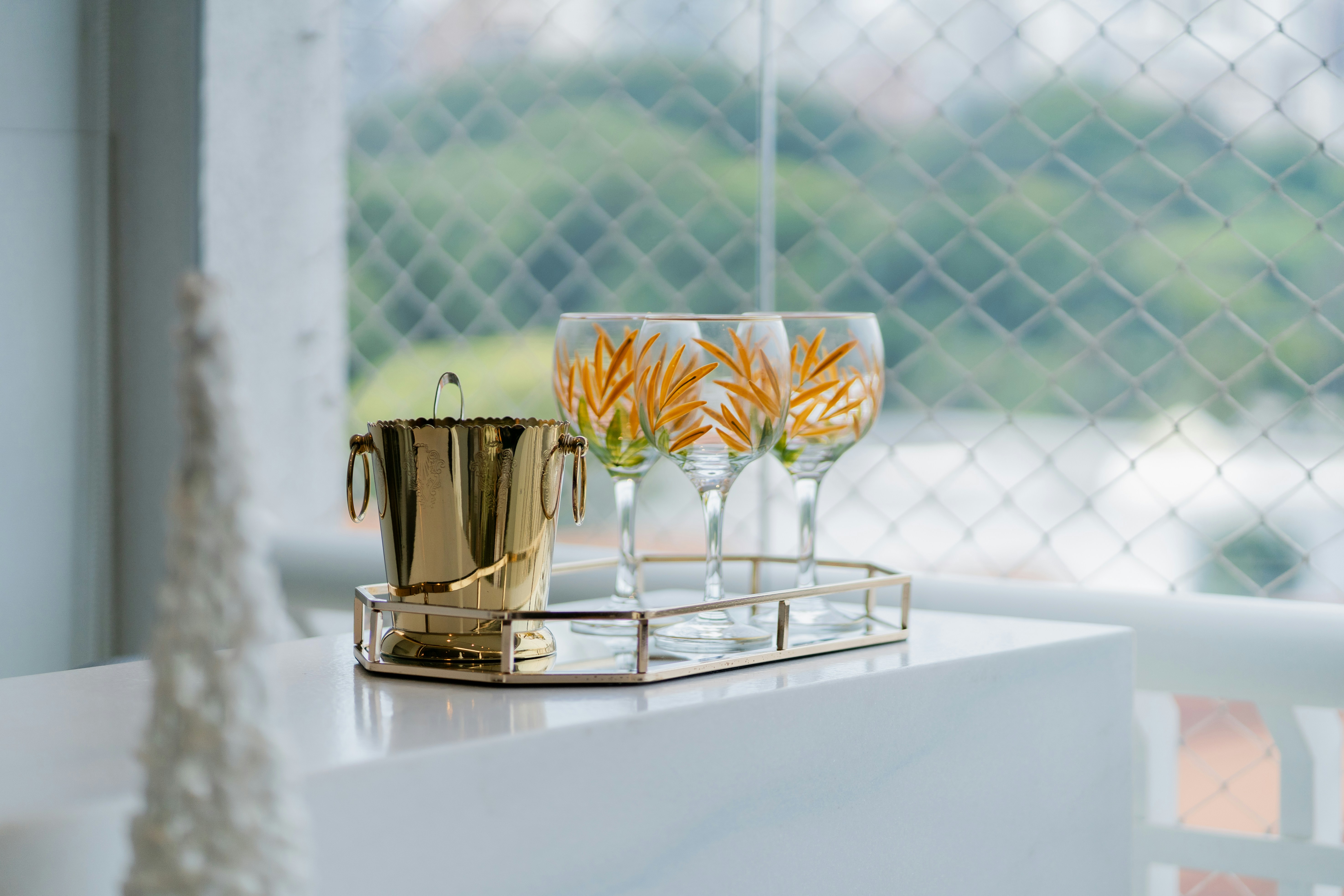 Amber-Leaf Glass Trio on a Window-Side Tray