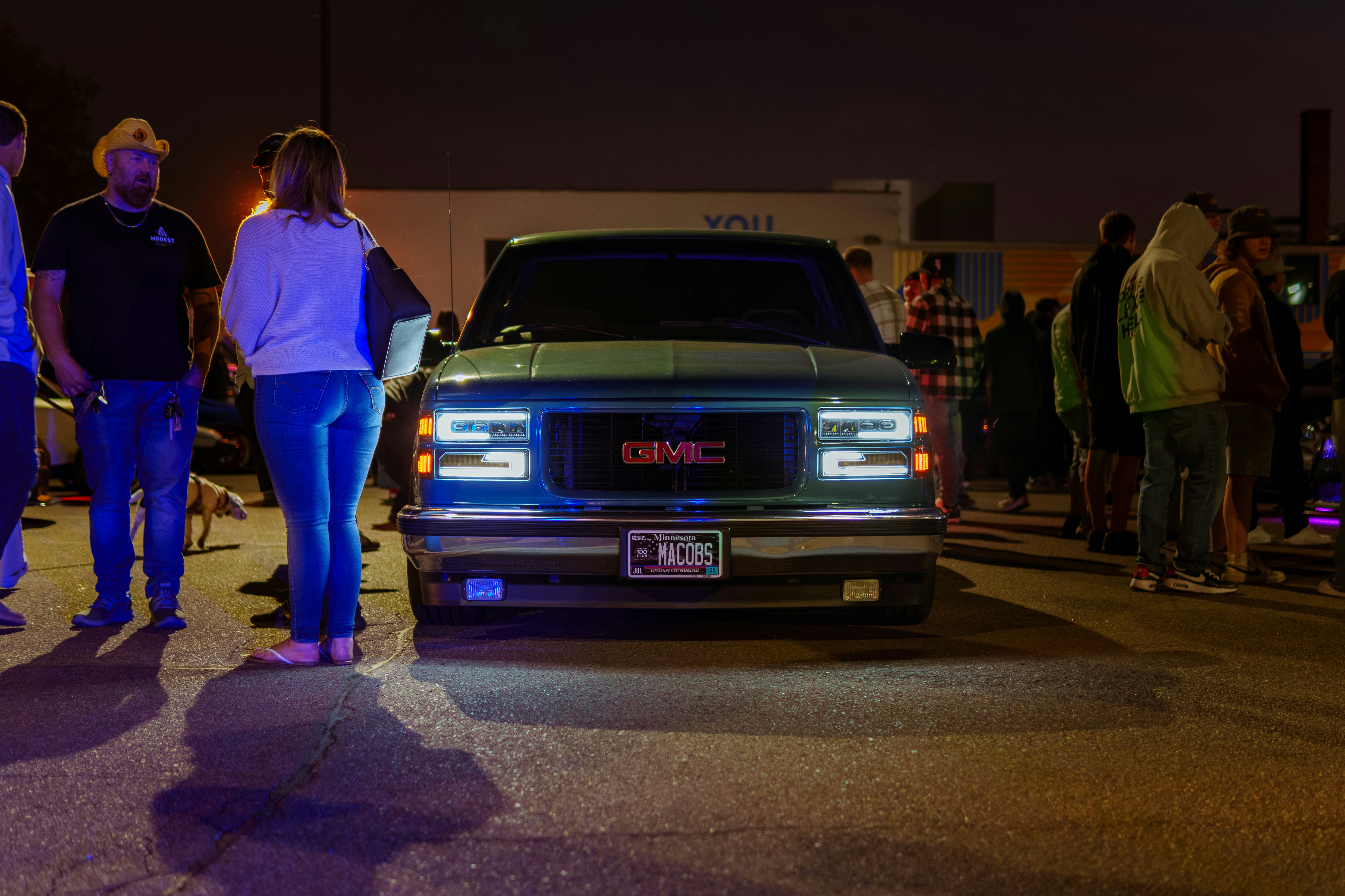 GMC Front at Neon Night: A Quiet Car Meet Under Streetlights