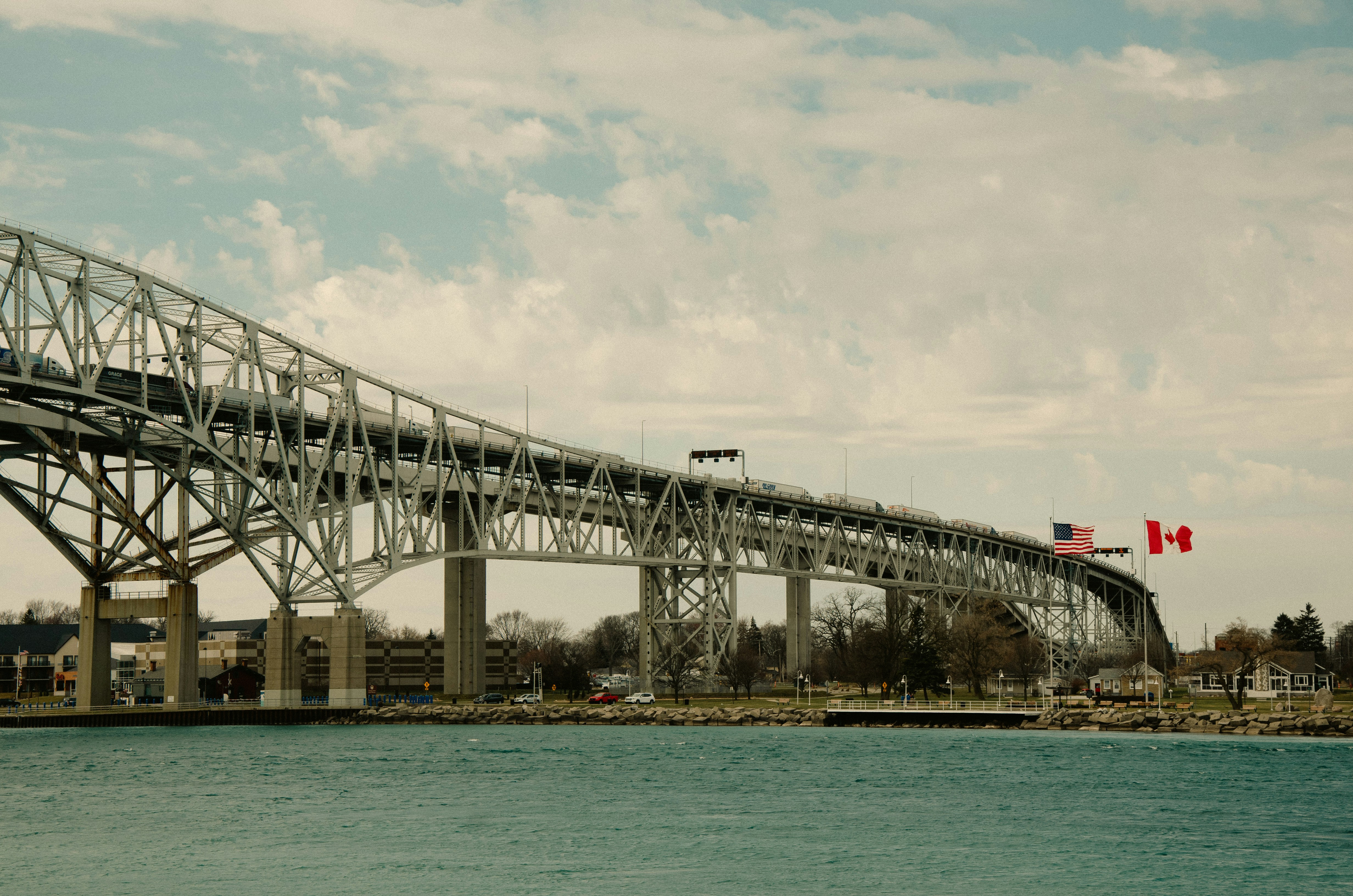 A large bridge over a large body of water photo – Free Spring Image on ...