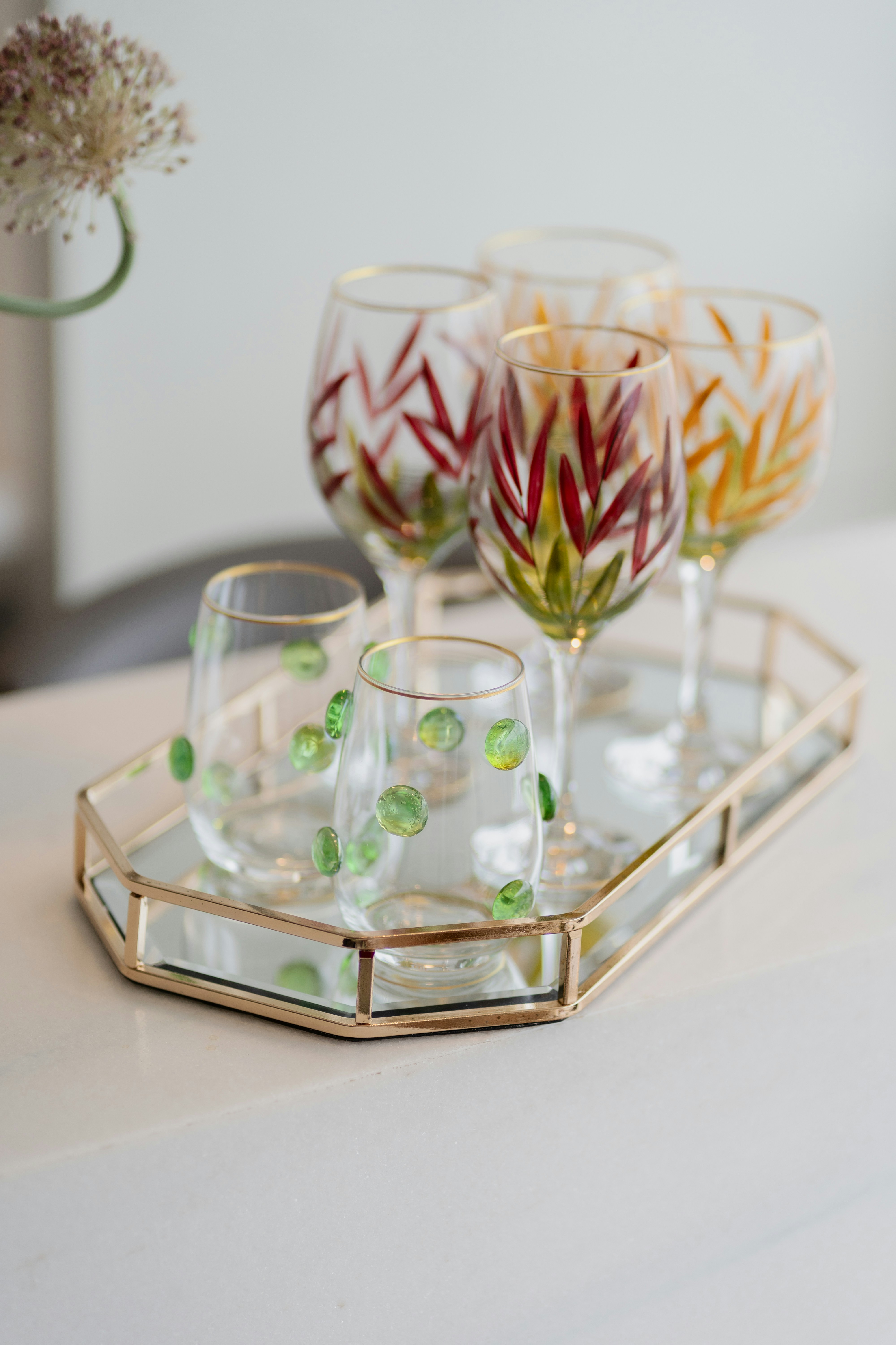Emerald Dots on a Gold-Trimmed Tray: a Quiet Tabletop Still Life