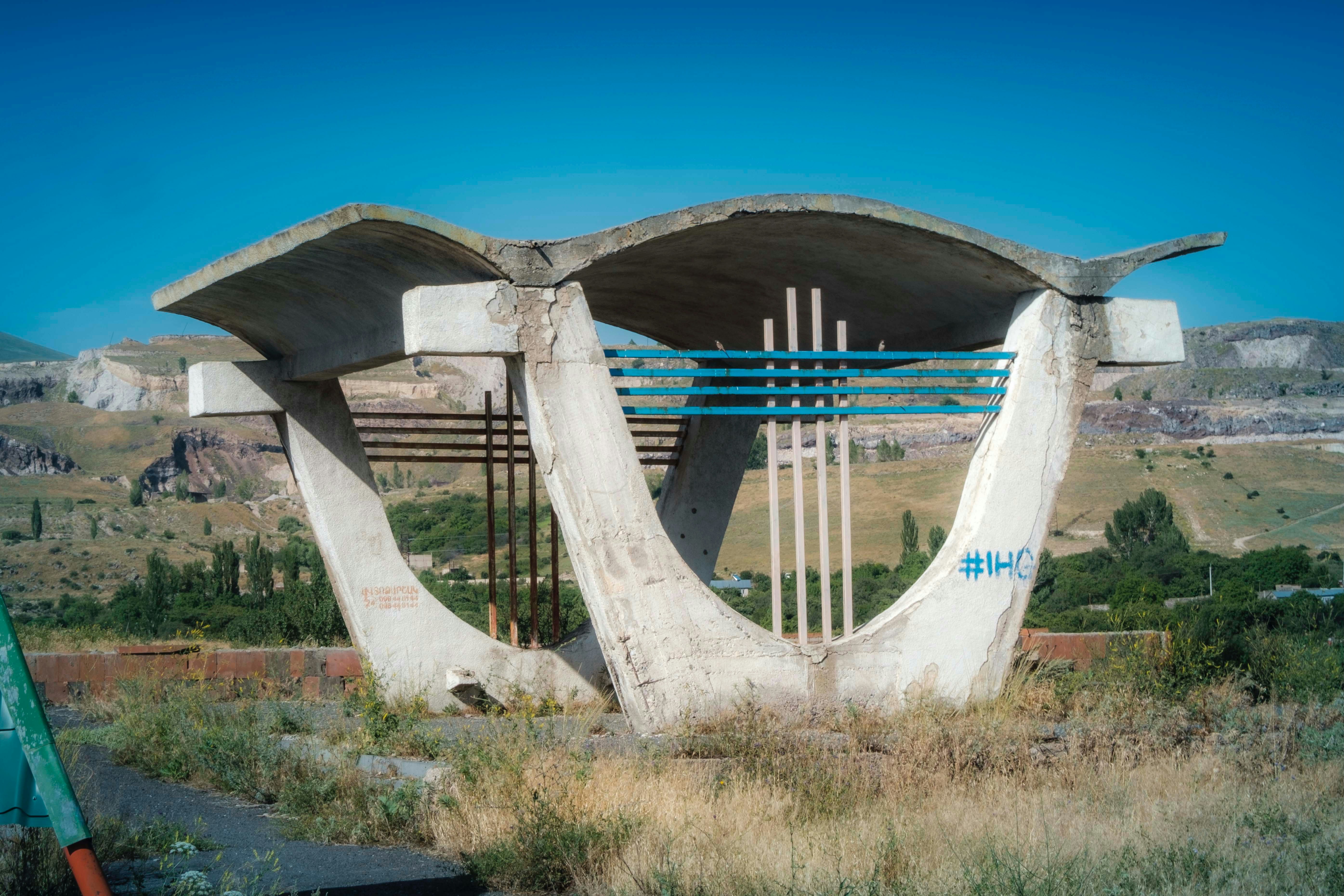 Arched Sculpture in Open Landscape
