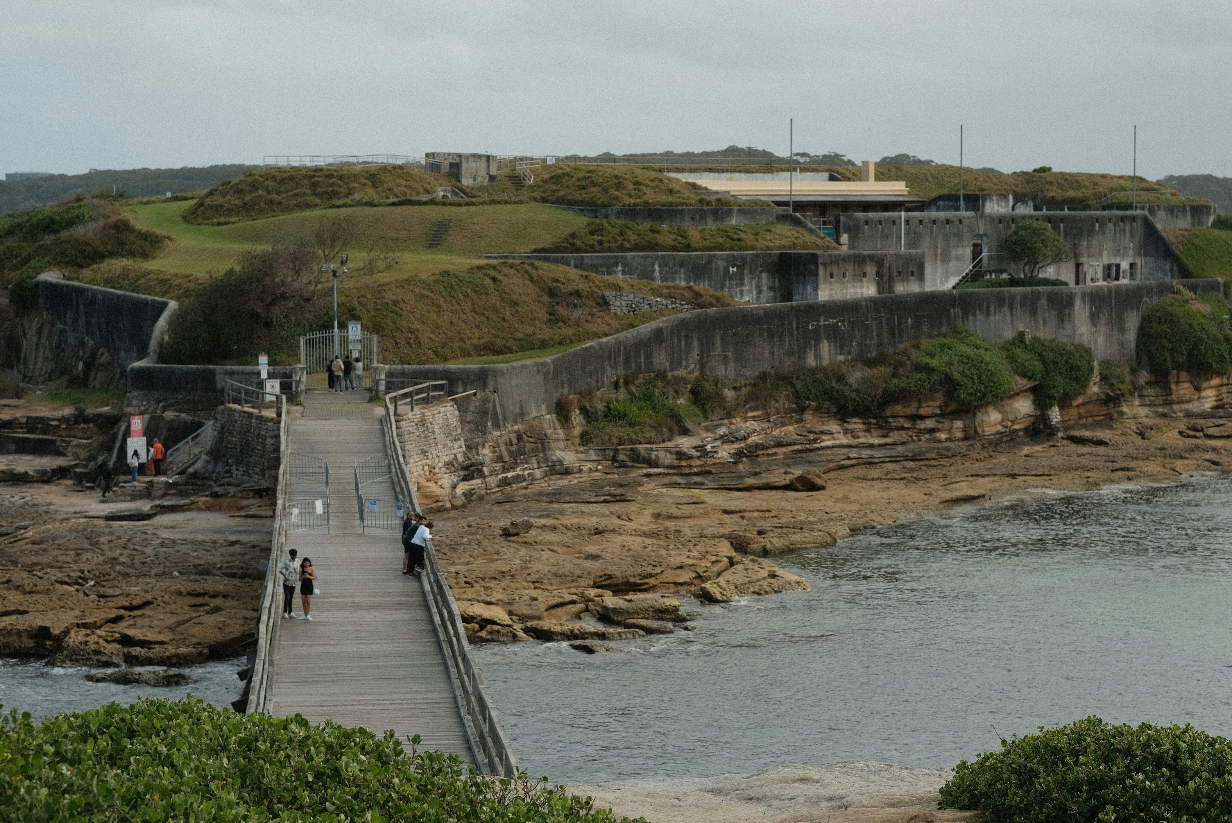 Bridge to the Quiet Fort: A Coastal Walkway Connects Shoreline Fortifications