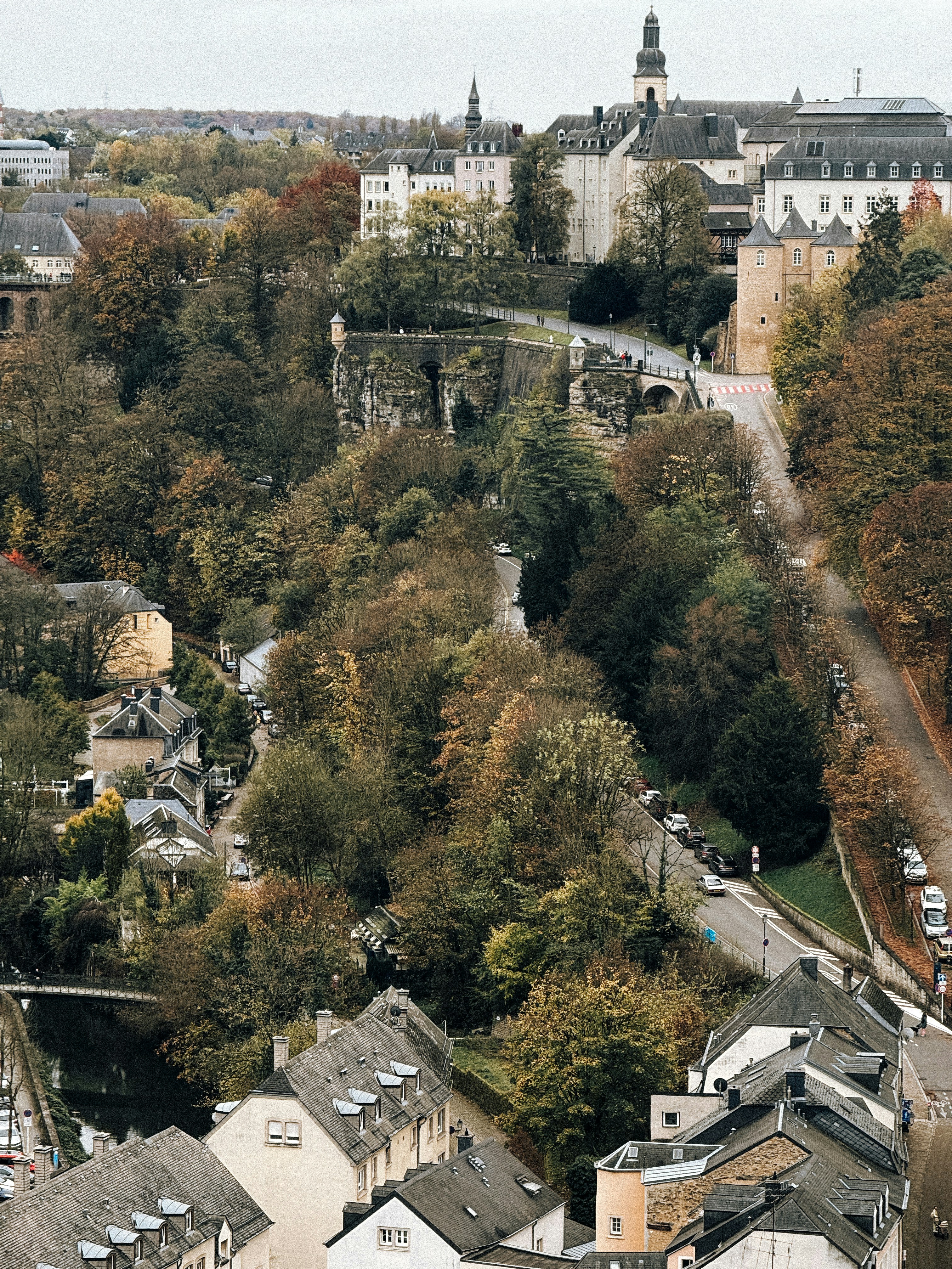 Autumn Overlook: Aerial View of a Riverside Town