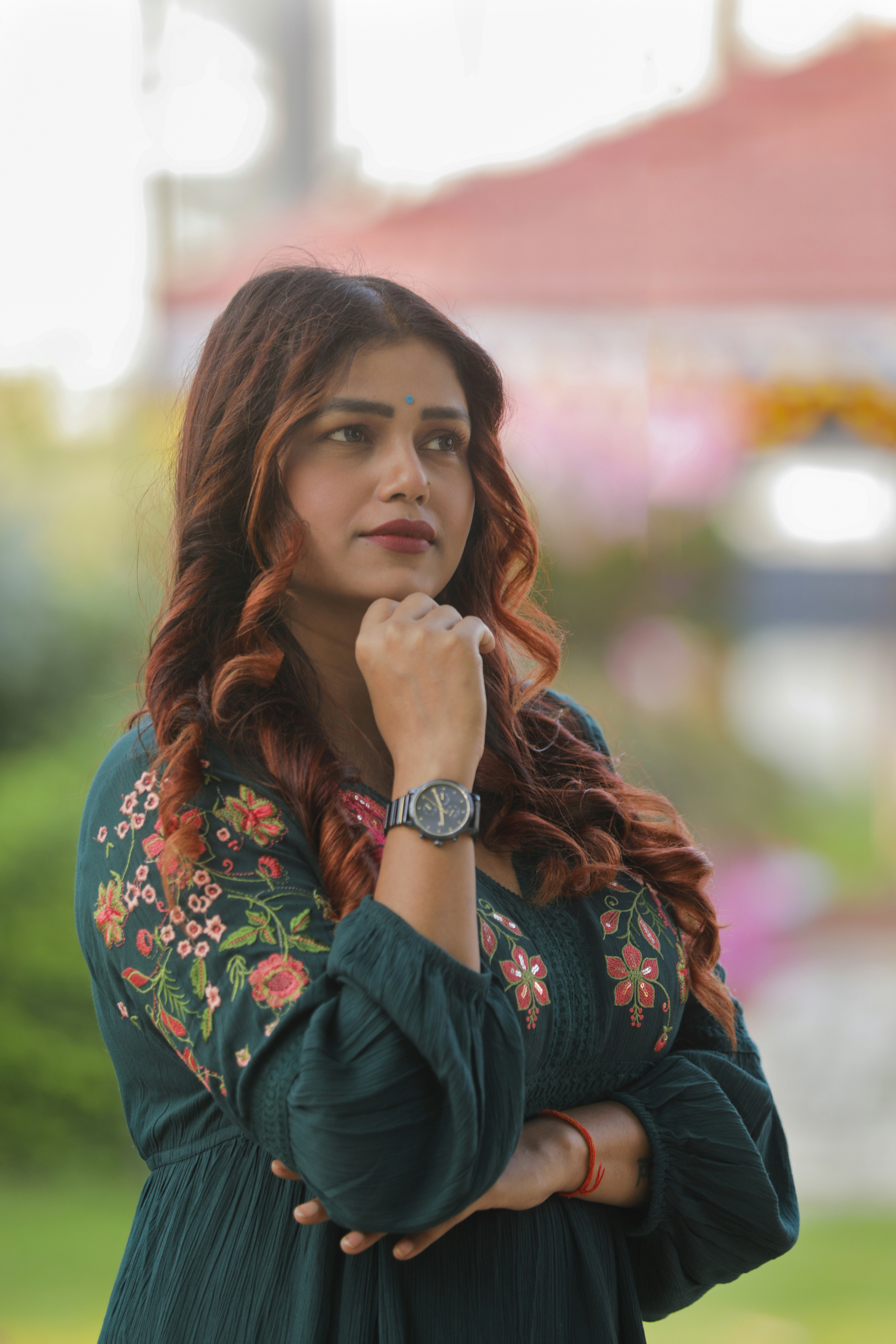Emerald Threads: A Portrait of Quiet Confidence