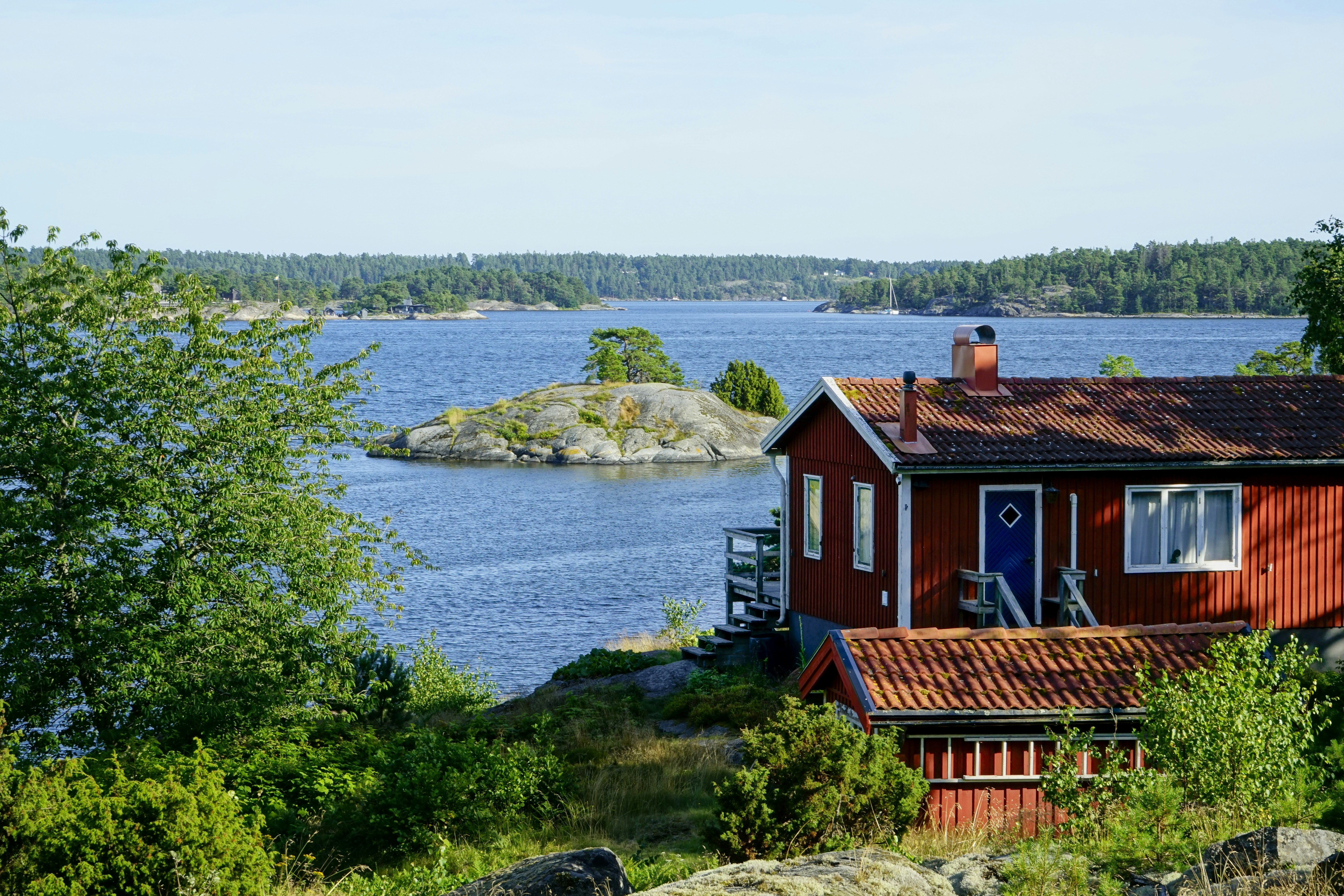 Red Cabin by the Quiet Fjord