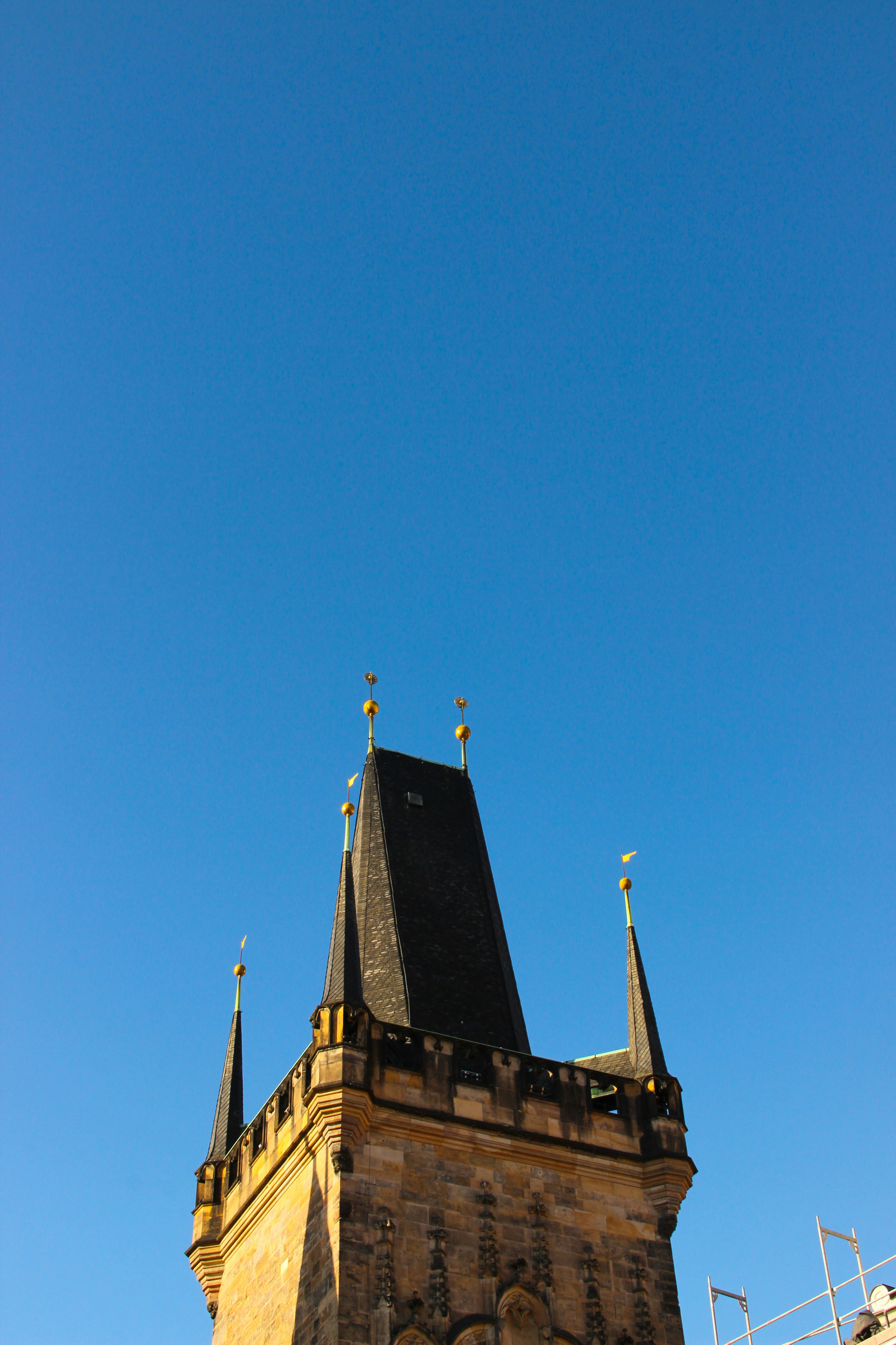A tall tower with a clock on the top of it