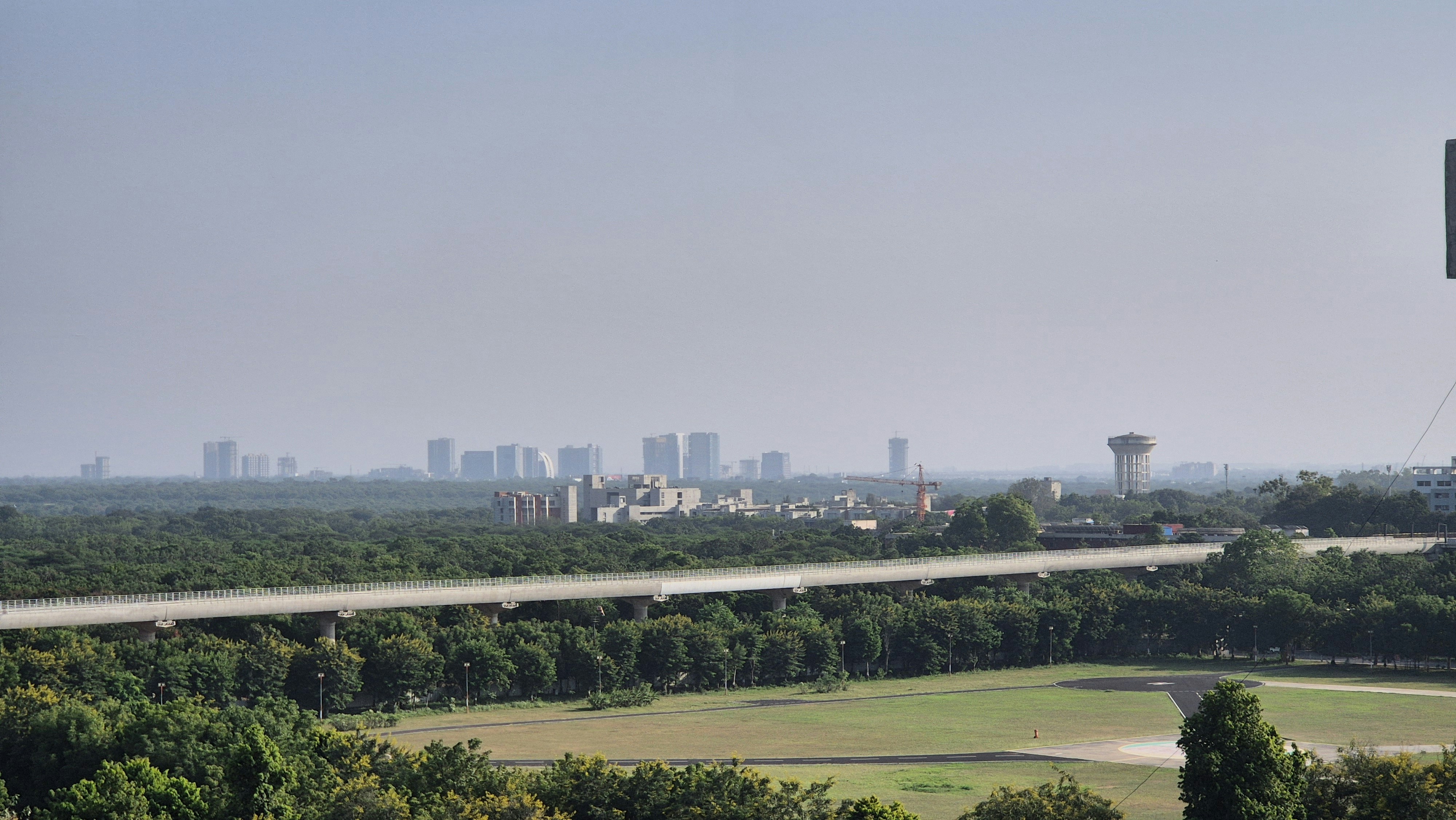 A view of a city from a hill photo – Free New sachivalay Image on Unsplash
