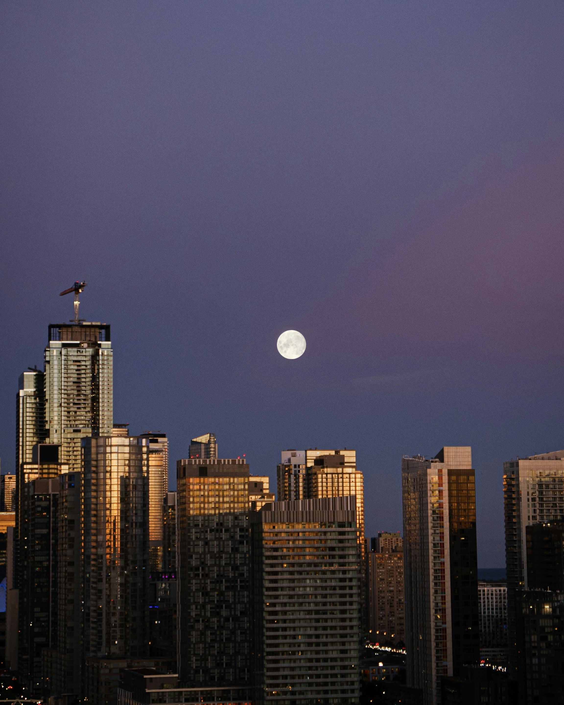 A full moon rises over a city skyline photo – Free Toronto Image on ...