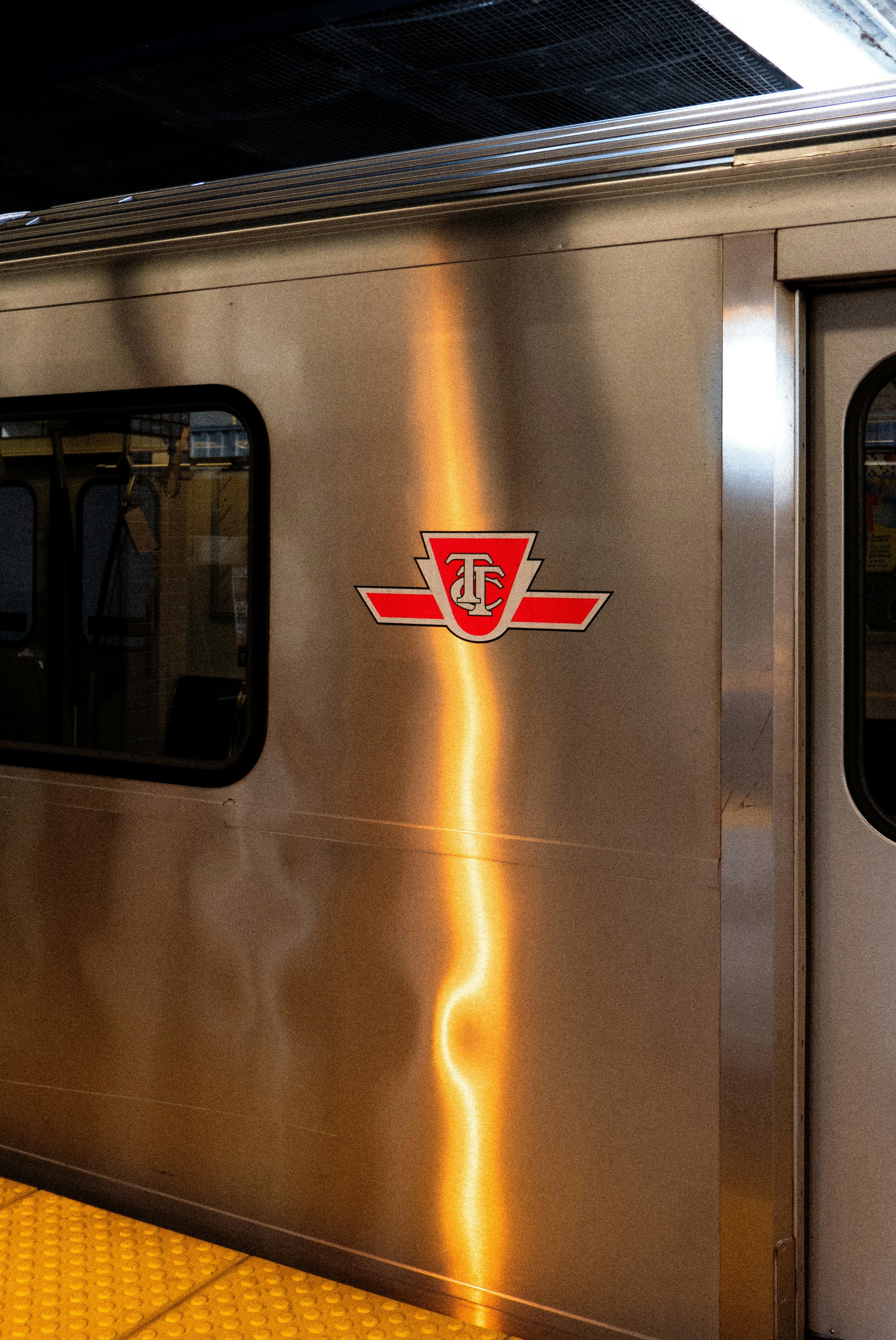 A silver subway train with its doors open photo – Free Toronto Image on ...