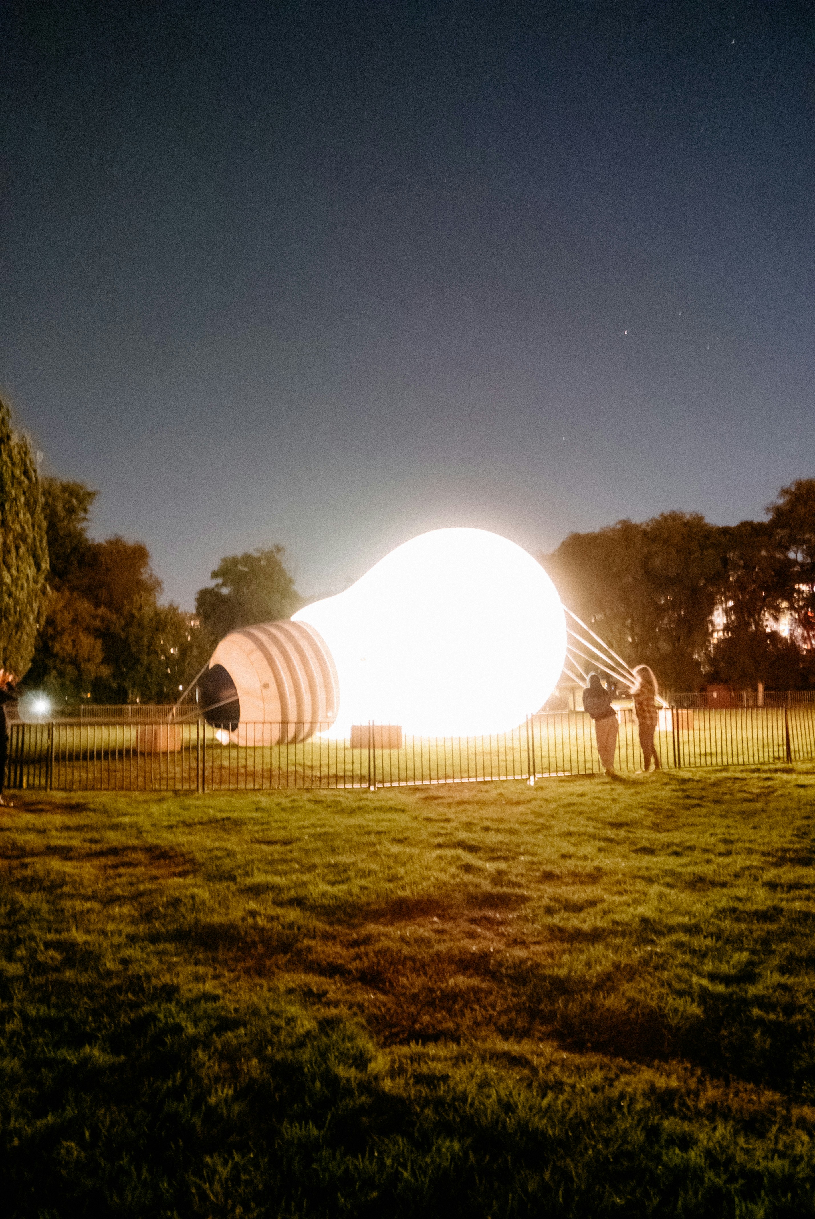 Giant Lantern Unfolds in the Park at Night
