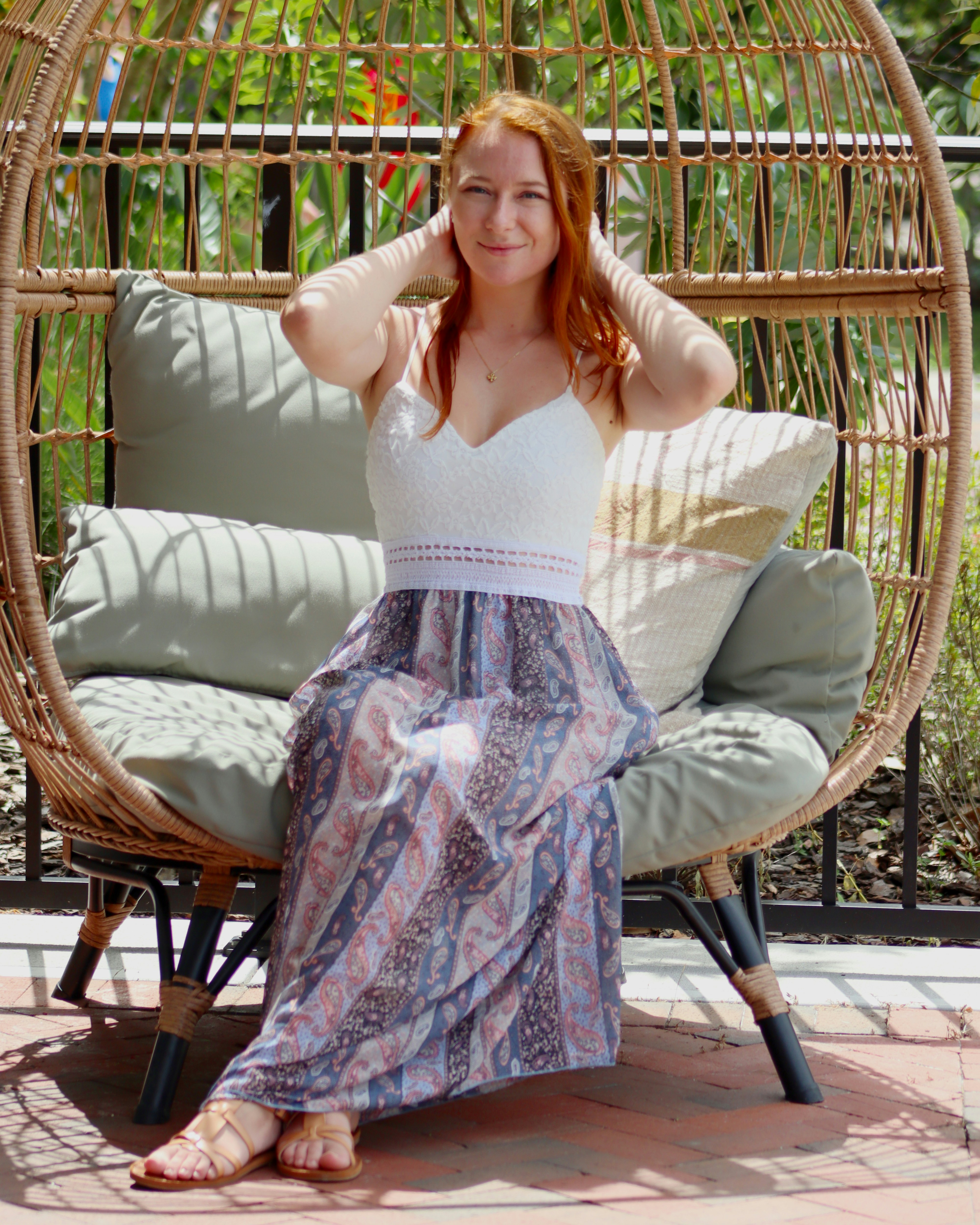 Sunlit Reverie in a Wicker Hanging Chair