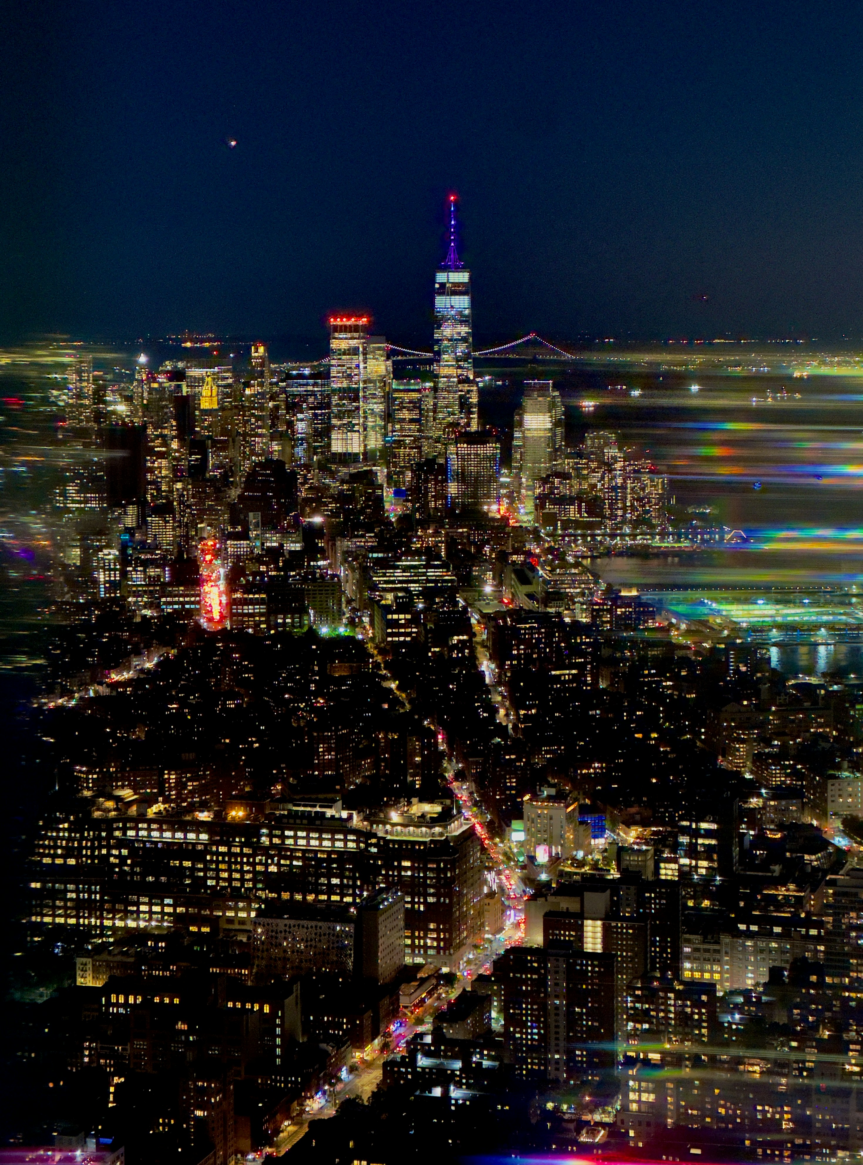 Prismatic Manhattan: Neon Veins Woven Through a Night Skyline