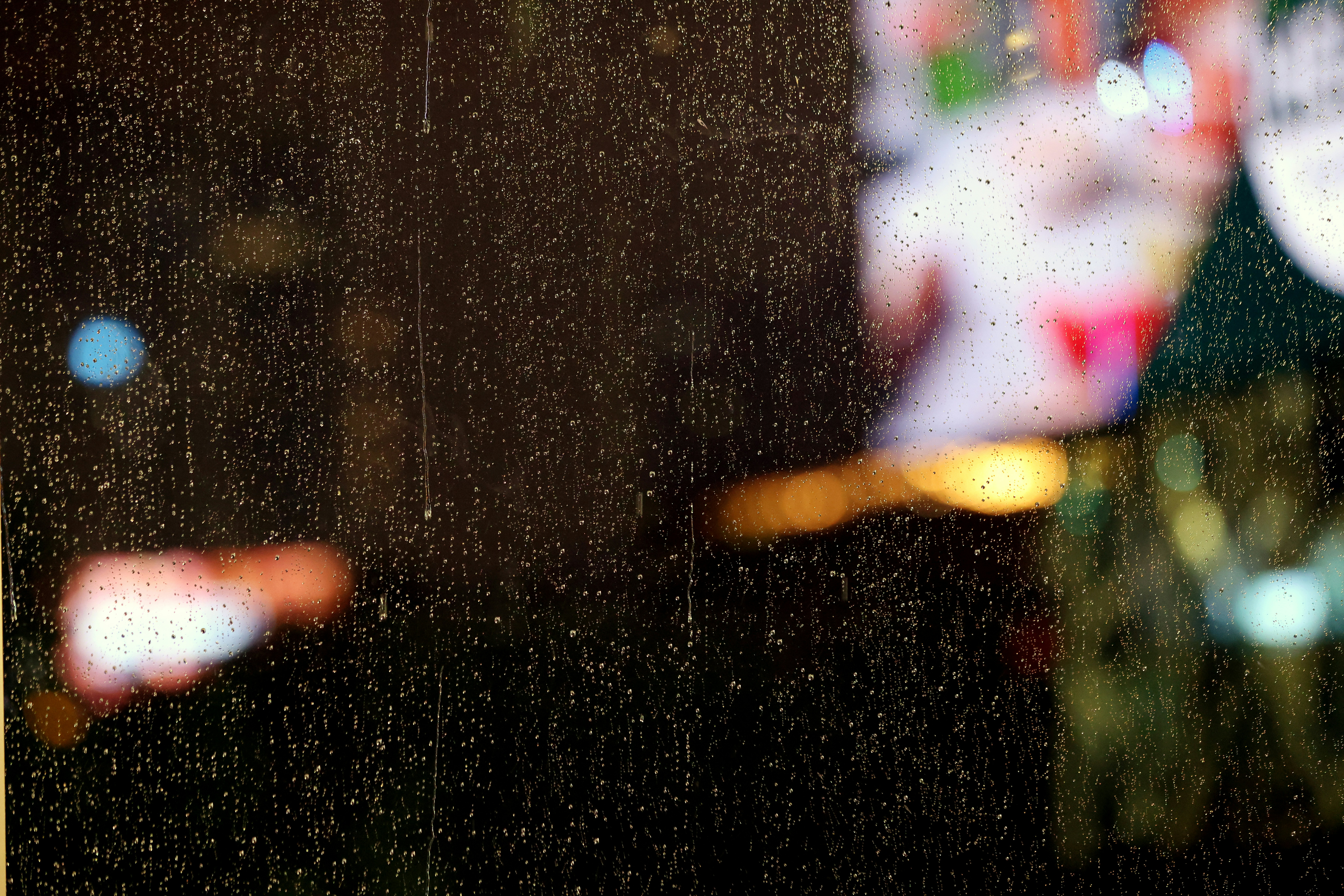 Rainy Neon Veil Over a Quiet Street