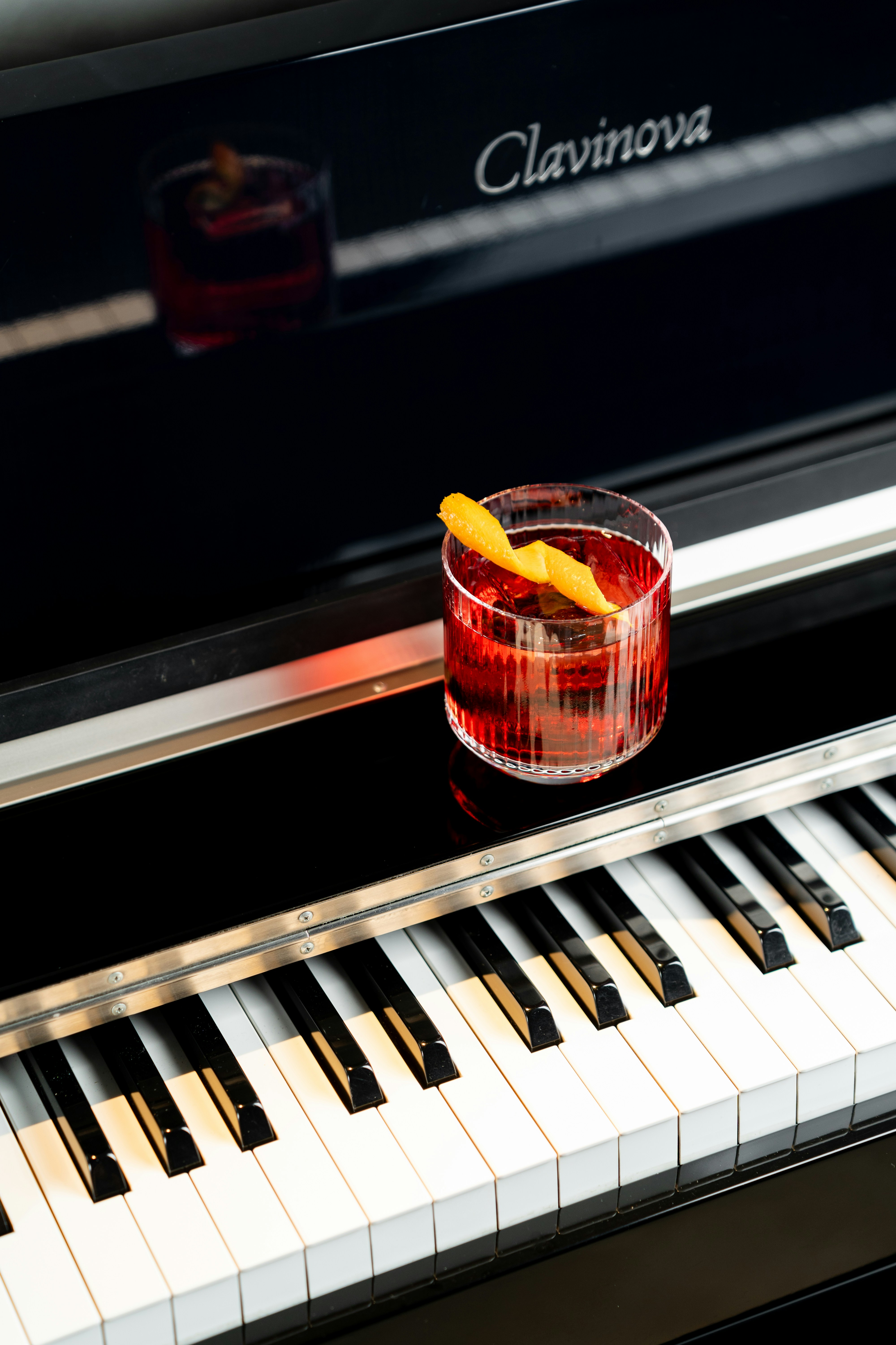 Crimson Sip on Ivory Keys: A Quiet Clavinova Moment