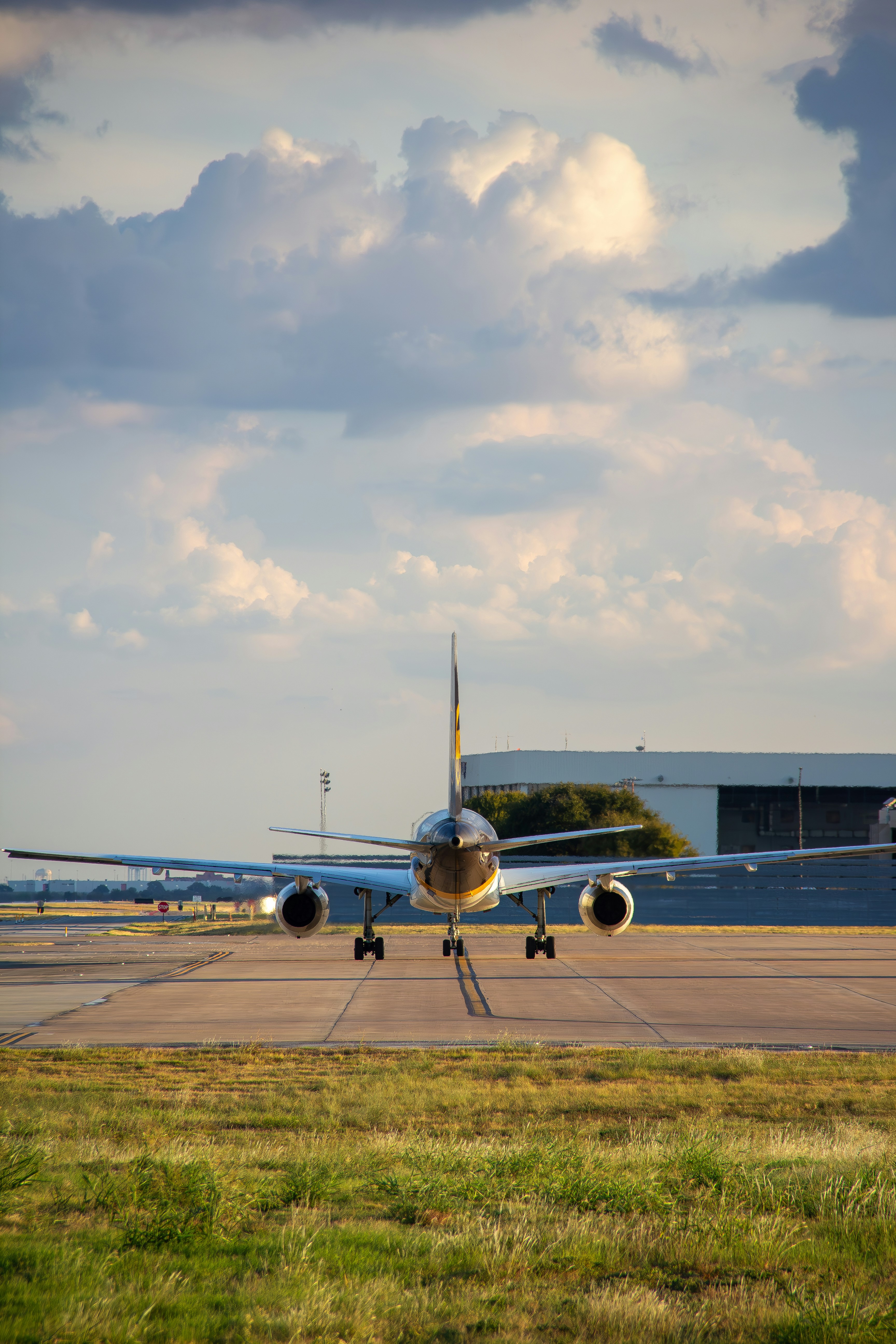 A large jetliner sitting on top of an airport runway photo – Free Dfw ...