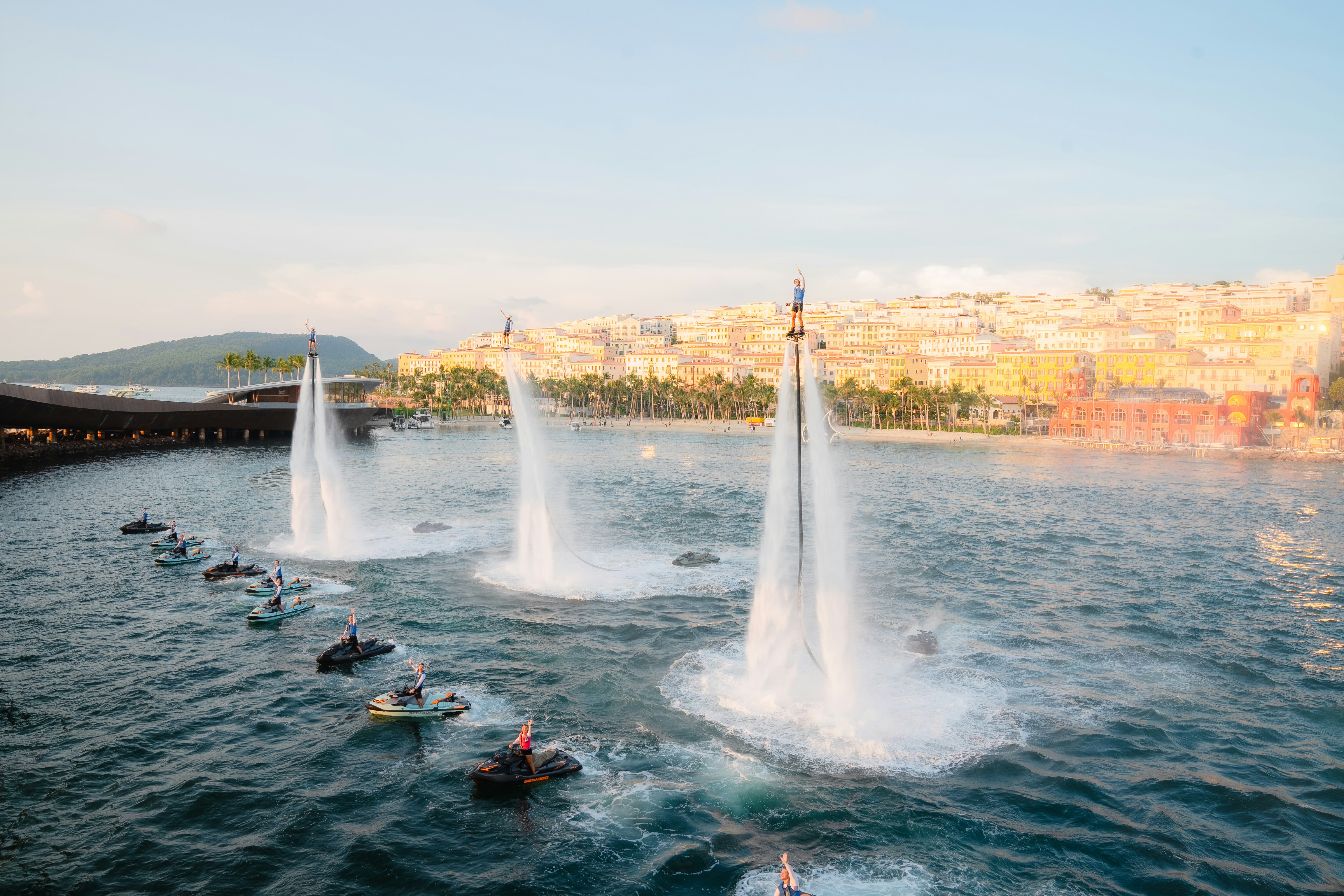 Hydrojet Spectacle over a Sunlit Coastal City