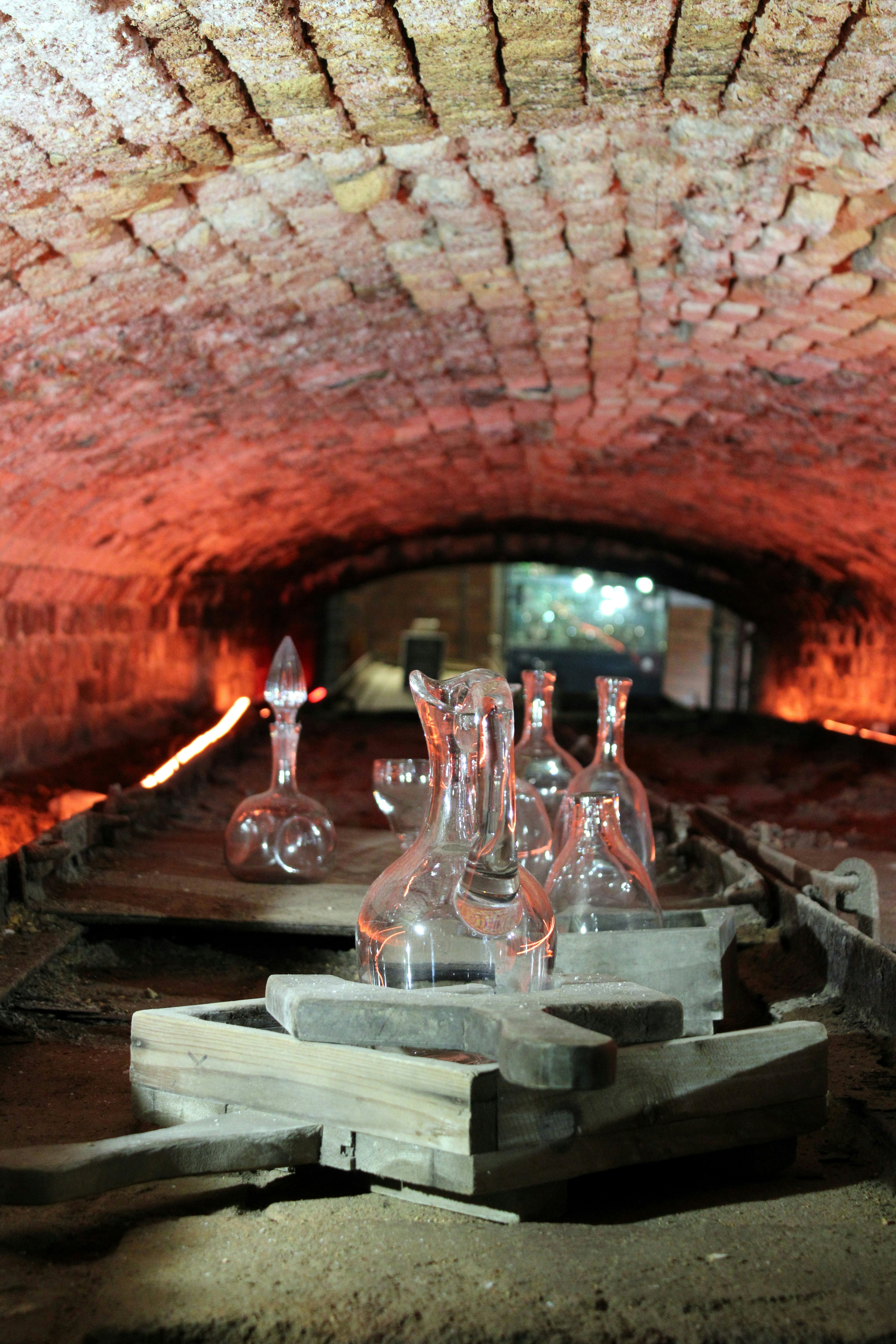 Amber-Glow Glassware in a Brick Tunnel Still-Life