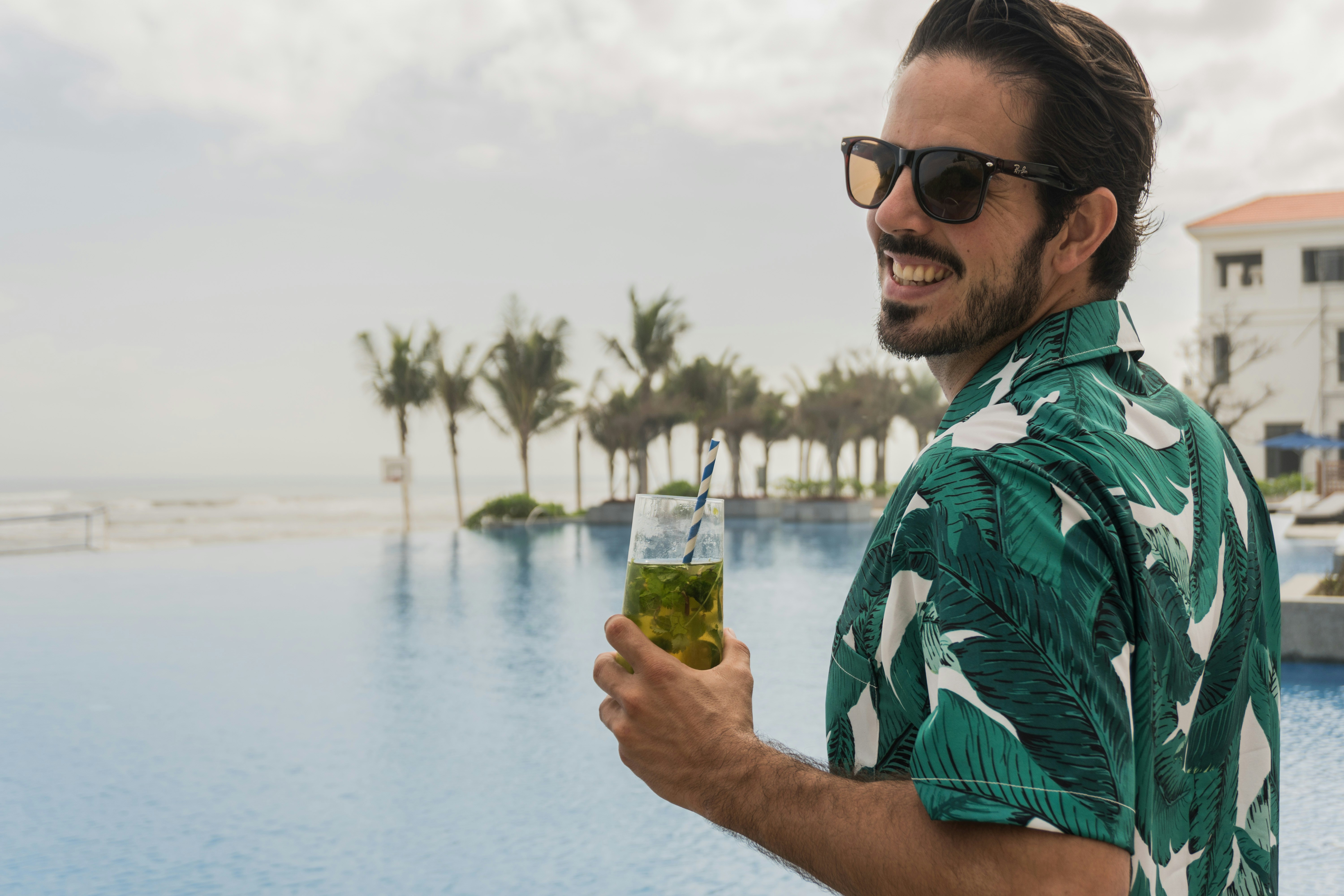 Sunlit Sipper: A coastal moment with a beaming smile